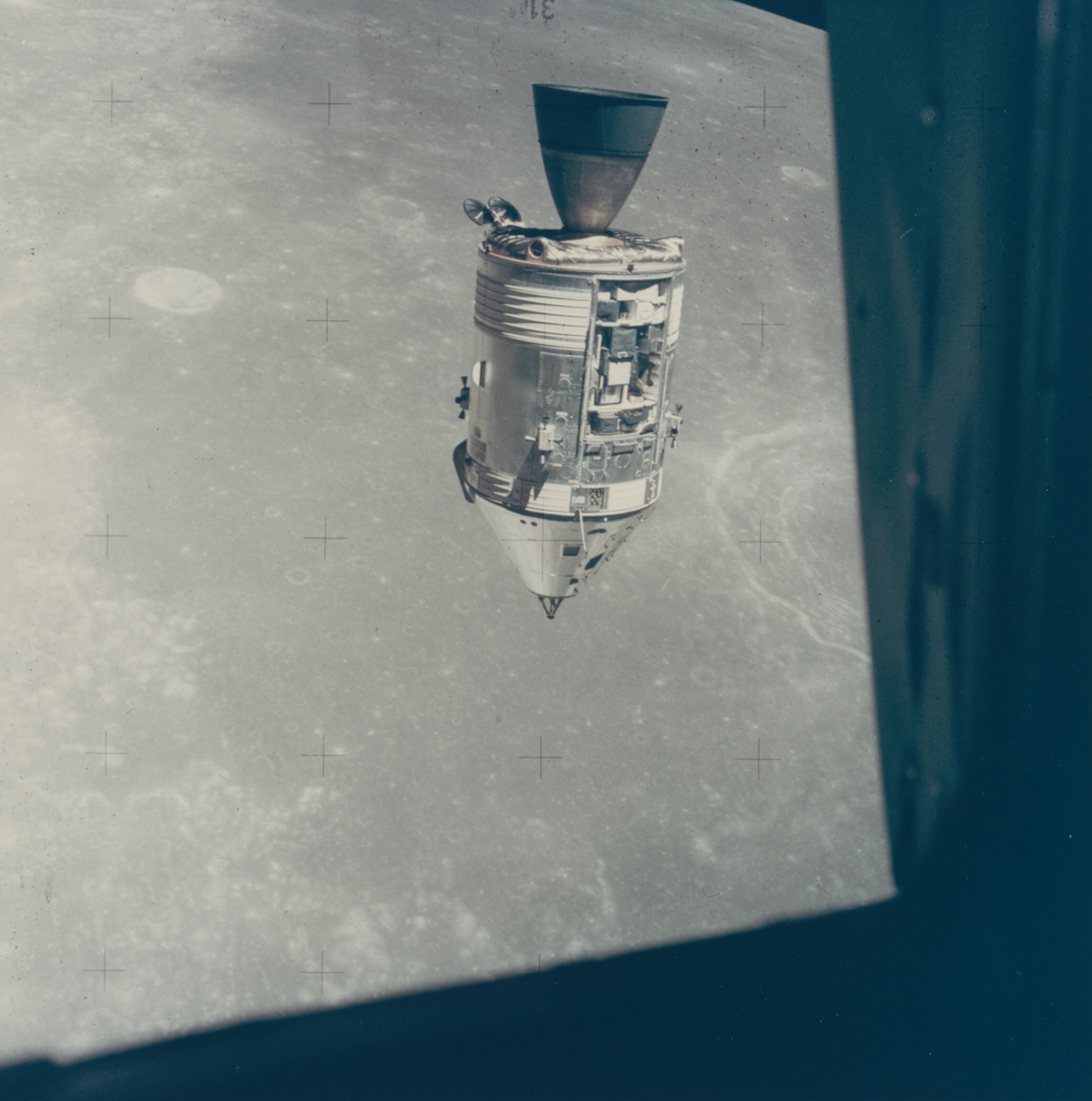 THE SIM BAY OF THE COMMAND MODULE ENDEAVOUR ORBITING OVER THE SEA OF ...