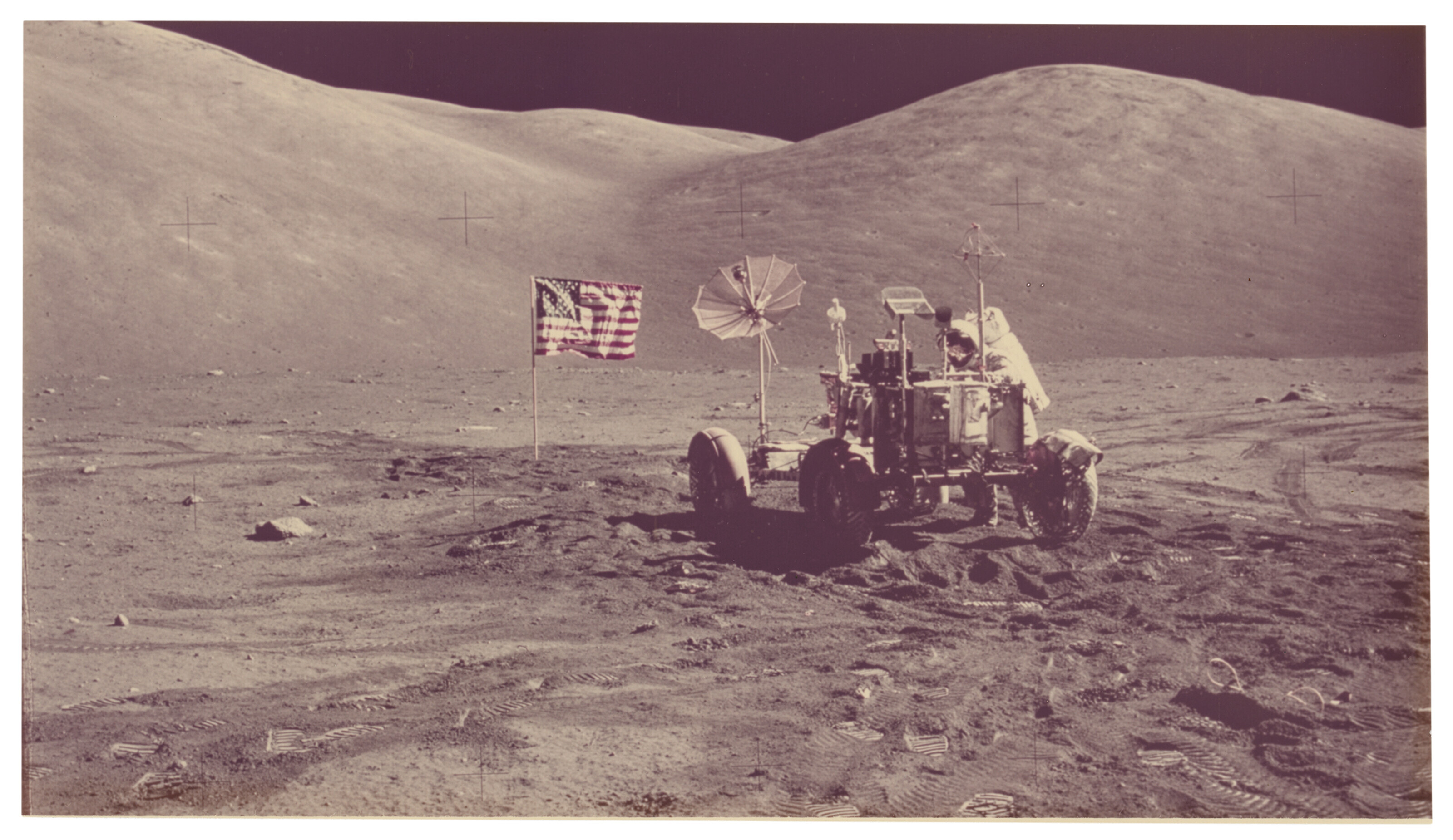 THE LUNAR ROVER PARKED NEAR THE AMERICAN FLAG, DECEMBER 7-19, 1972 ...