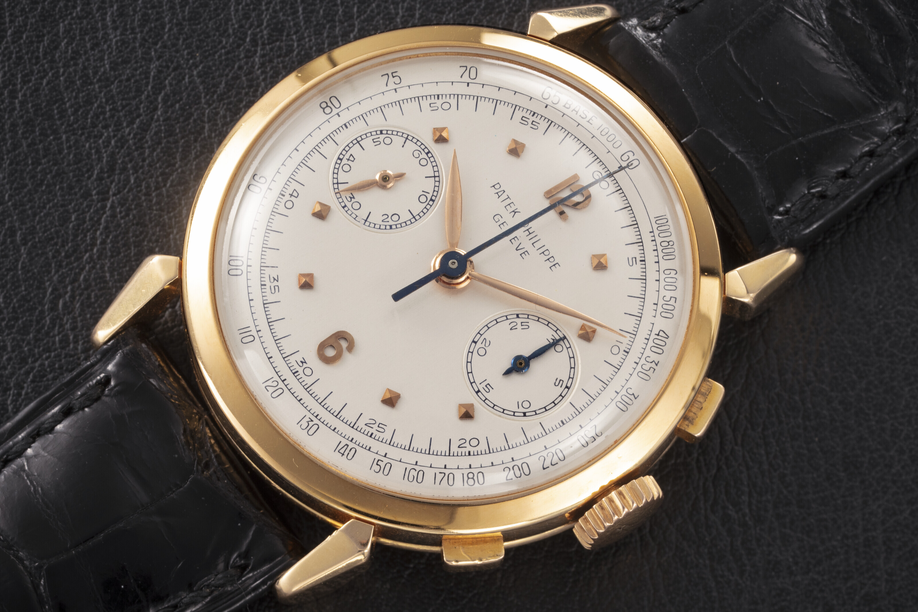 PATEK PHILIPPE, REF. 1579J, A RARE GOLD MANUAL-WINDING CHRONGRAPH, CASE ...