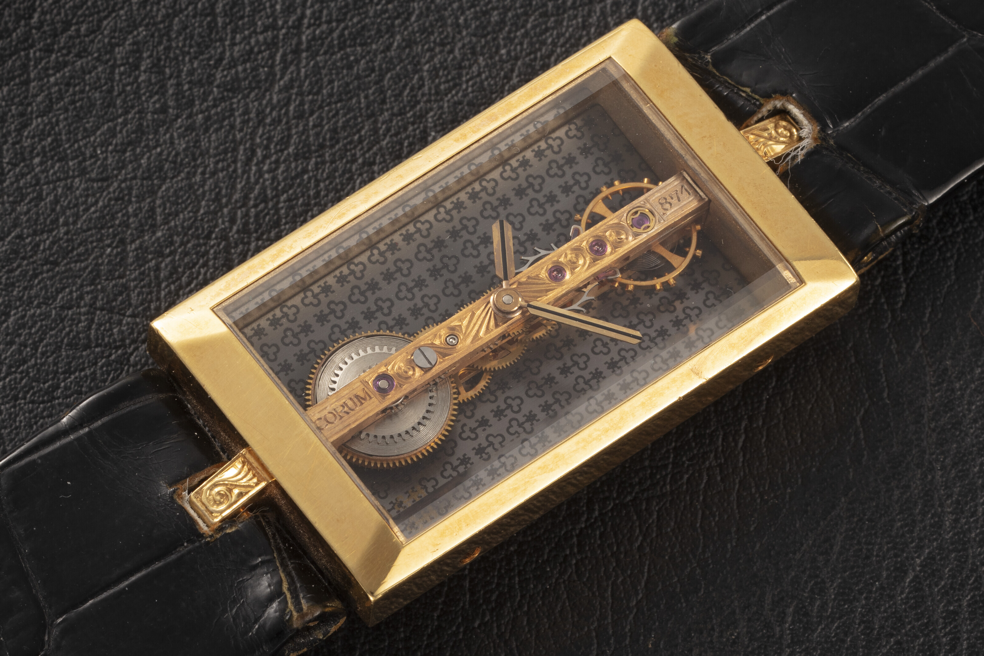 CORUM, GOLDEN BRIDGE REF. 13201, A RECTANGULAR GOLD AUTOMATIC ...