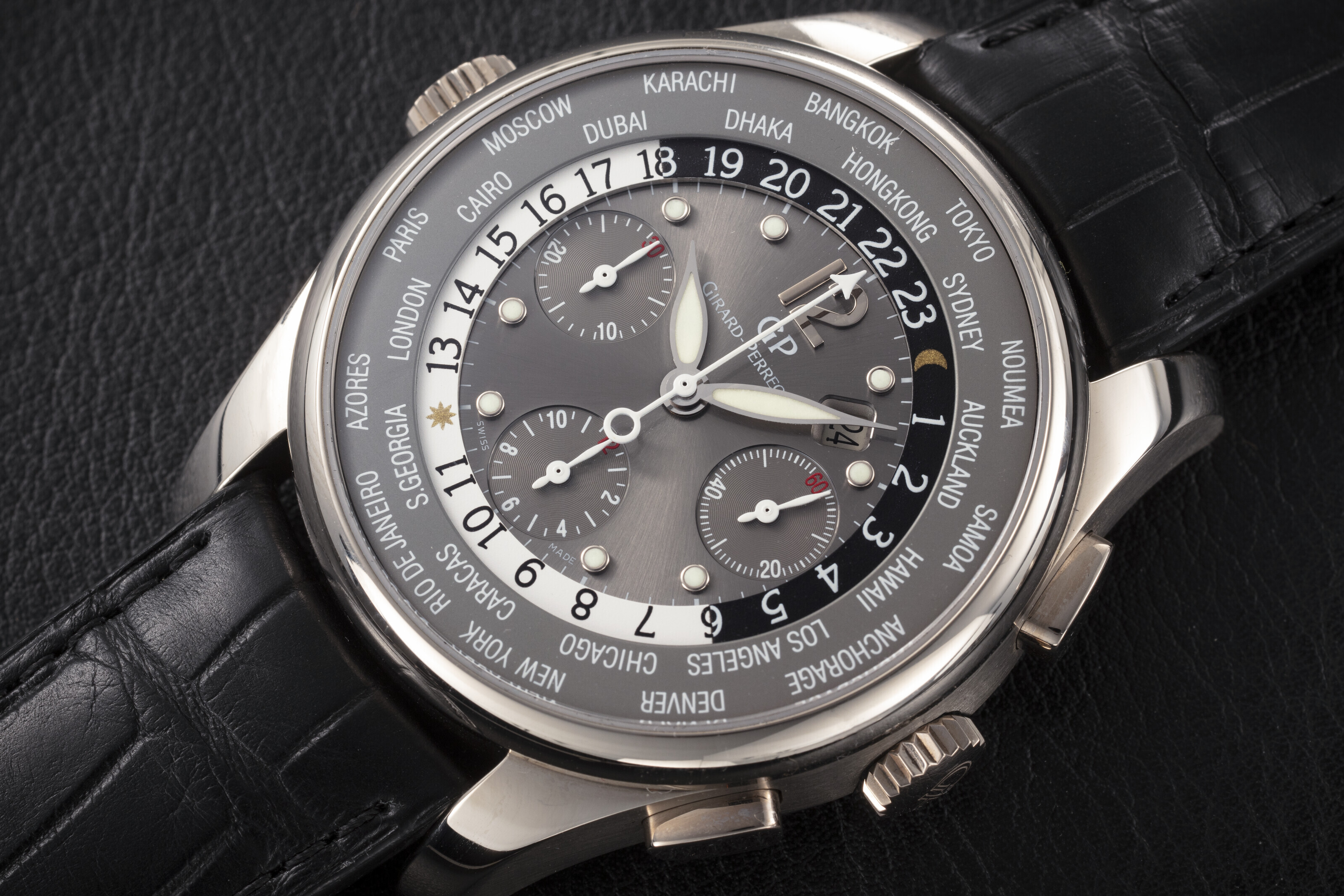 GIRARD-PERREGAUX, WW.TC REF. 49805, A GOLD AUTOMATIC WORLD TIME ...