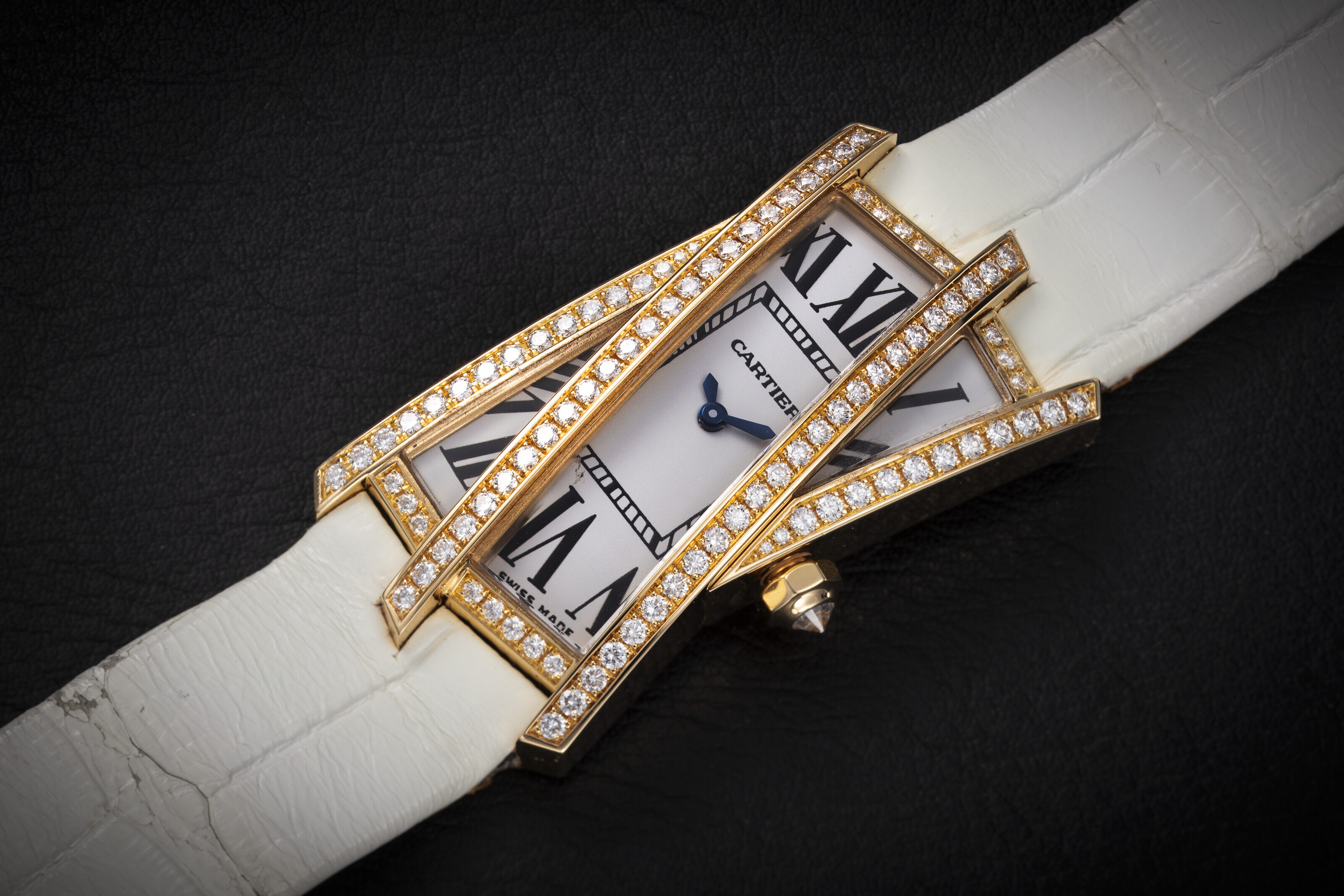 CARTIER, TANK CRASH REF. 2899, A STYLISH GOLD AND DIAMOND-SET LADIES ...