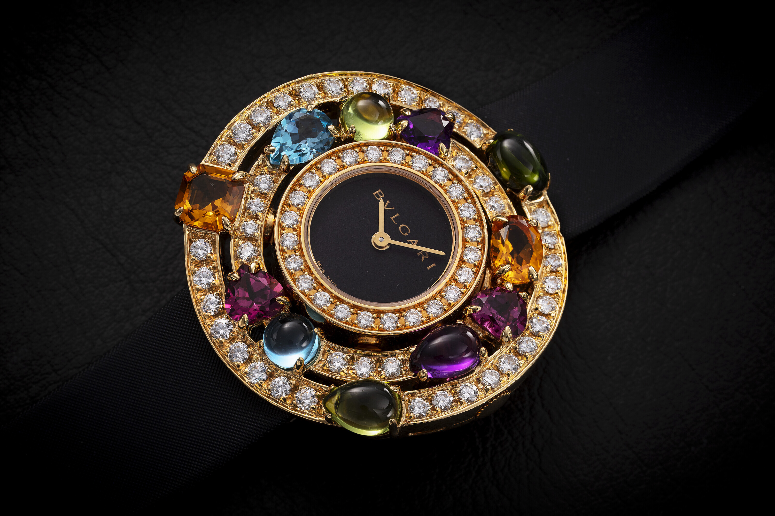 BULGARI ASTRALE CERCHI, AN IMPRESSIVE GOLD, DIAMOND AND GEMSTONES-SET ...