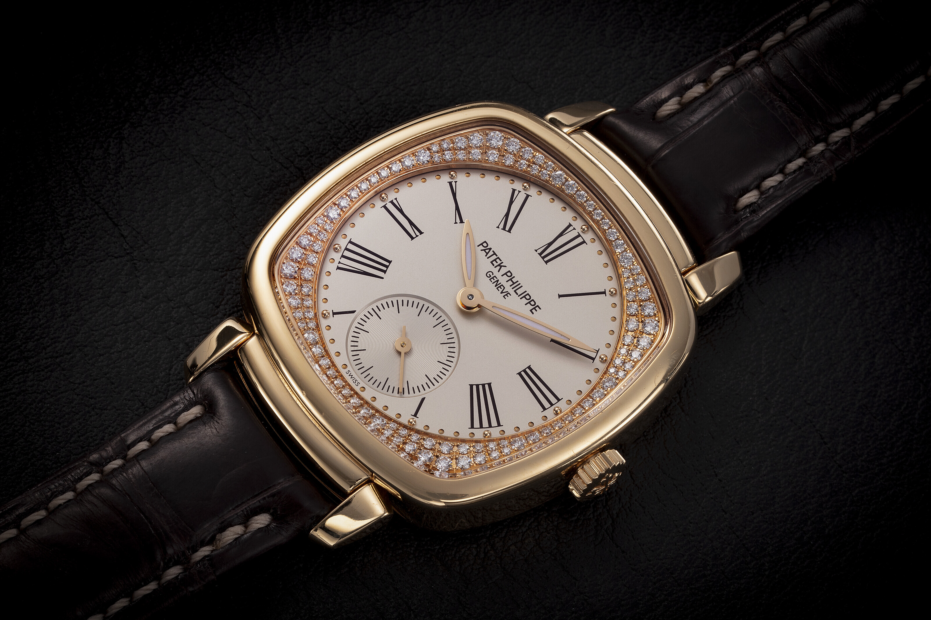 PATEK PHILIPPE, GONDOLO REF. 7041R, AN ELEGANT GOLD MANUAL-WINDING ...