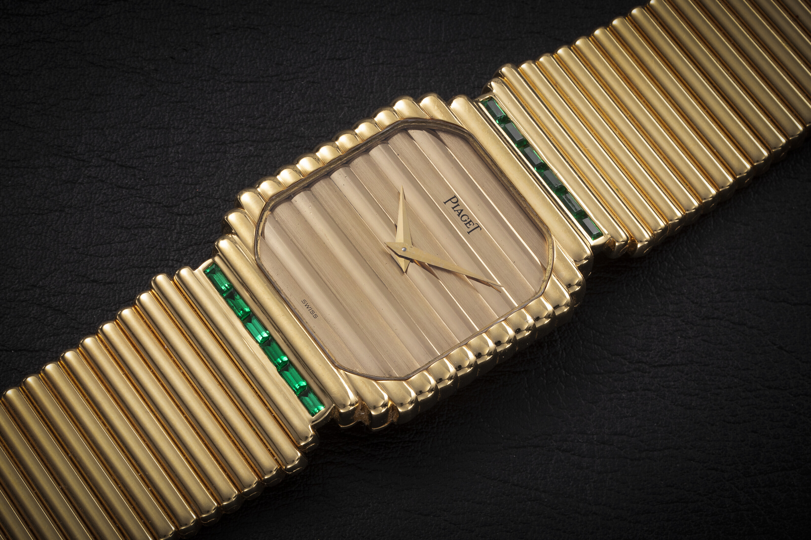 PIAGET, REF. 7340511, A GOLD AND EMERALD-SET WRISTWATCH, CASE NUMBER ...