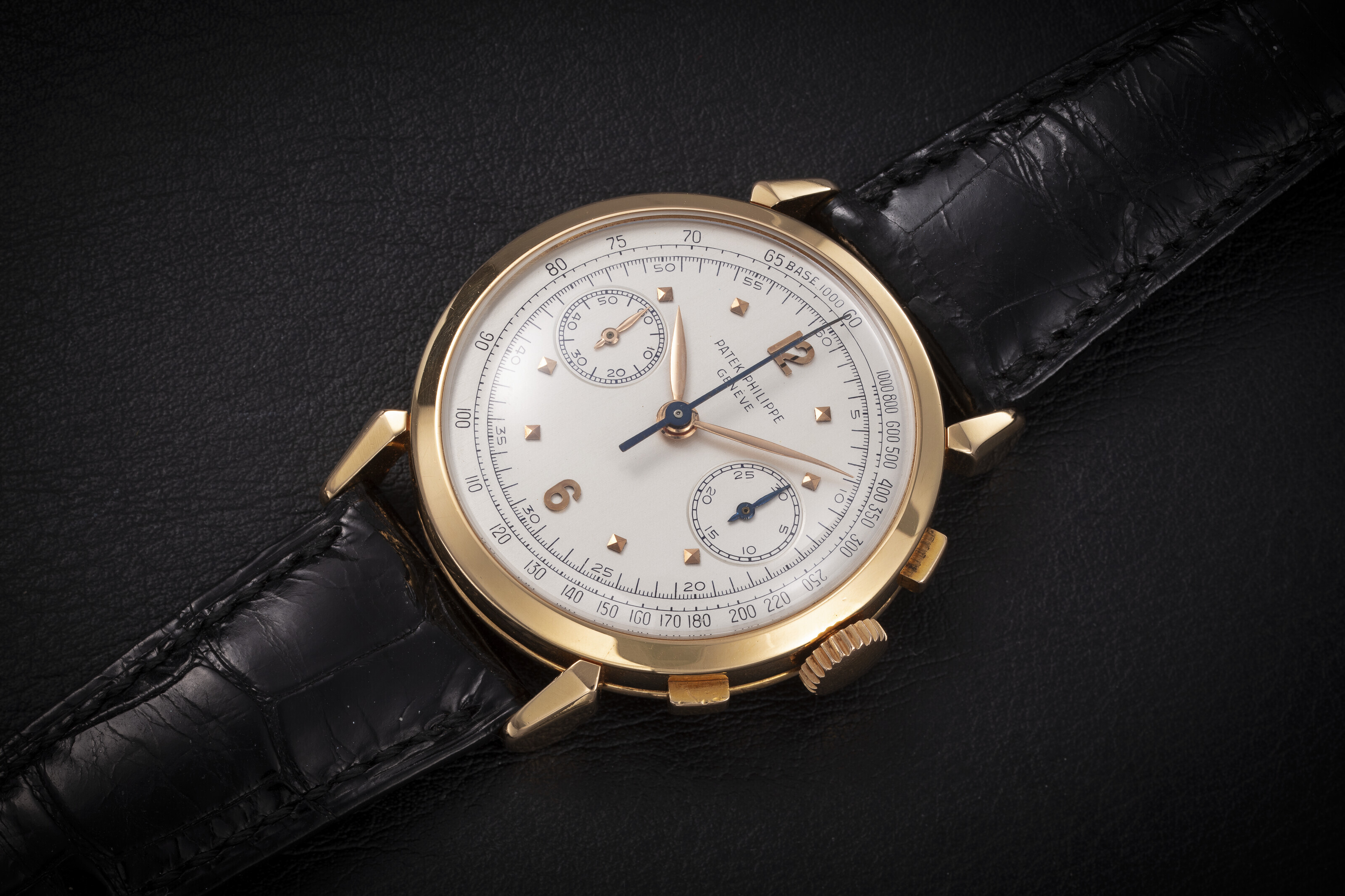 PATEK PHILIPPE, REF. 1579J, A RARE GOLD MANUAL-WINDING CHRONGRAPH, CASE ...