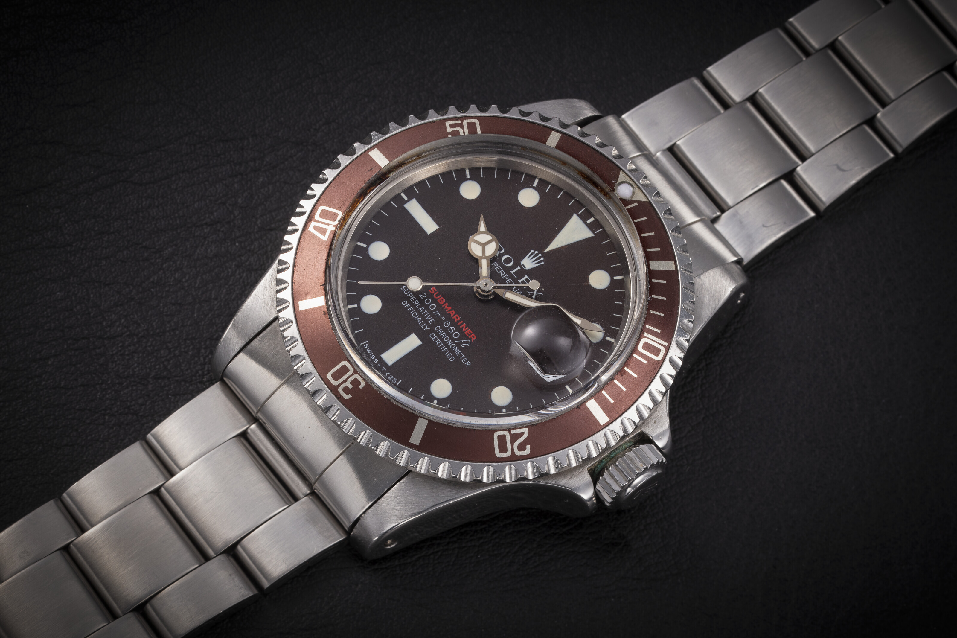 ROLEX, SUBMARINER REF. 1680 ‘TROPICAL’, A STEEL AUTOMATIC DIVER’S WATCH ...