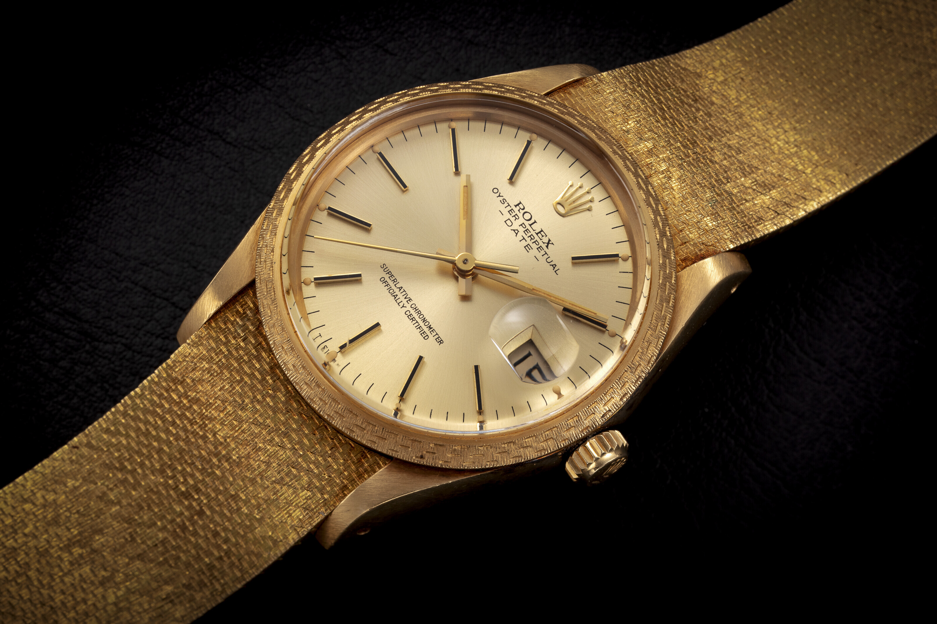 ROLEX, OYSTER PERPETUAL DATE RE. 15148, AN ATTRACTIVE GOLD AUTOMATIC ...