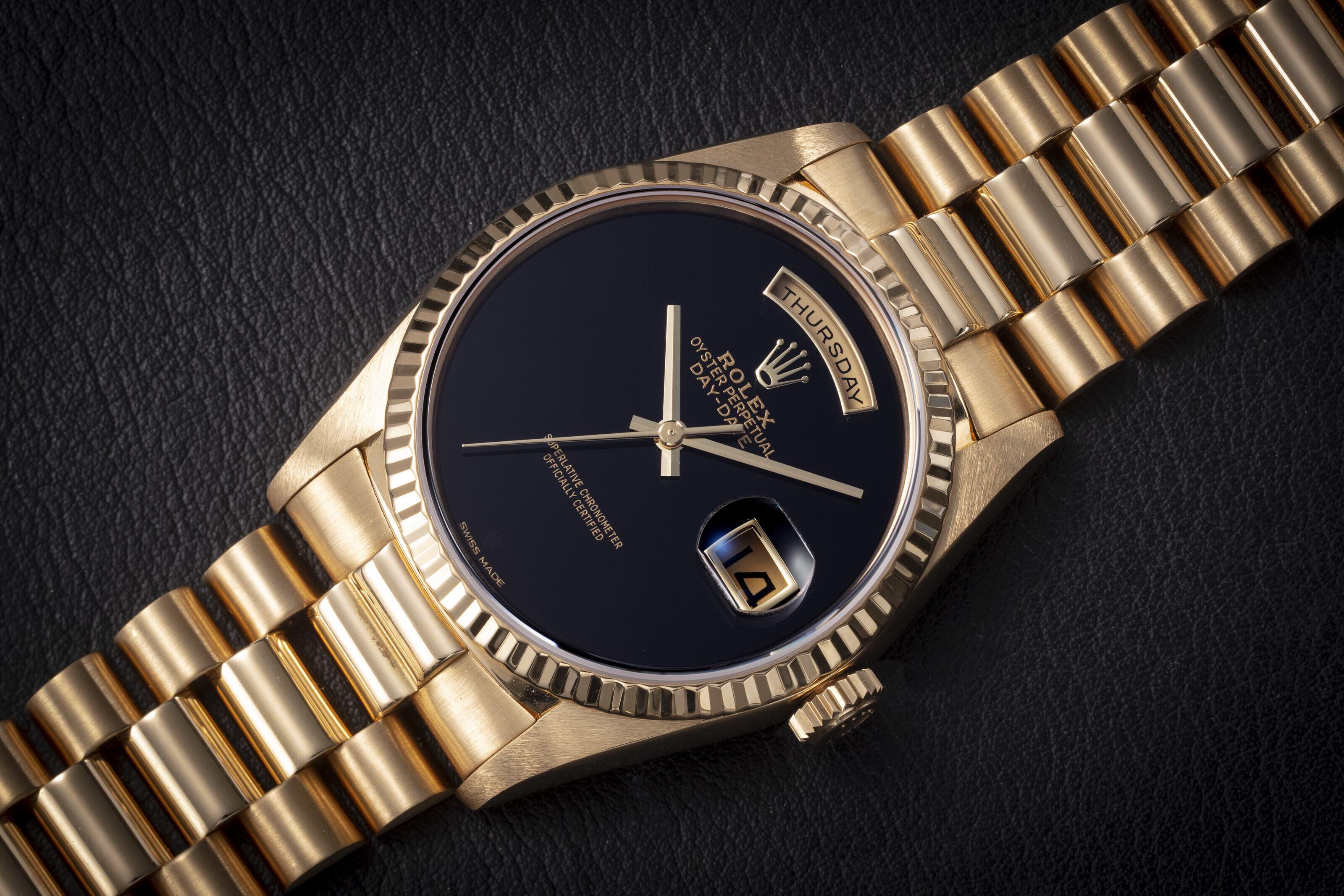 ROLEX, DAY-DATE REF. 18238, A GOLD AUTOMATIC WRISTWATCH WITH ONYX DIAL ...