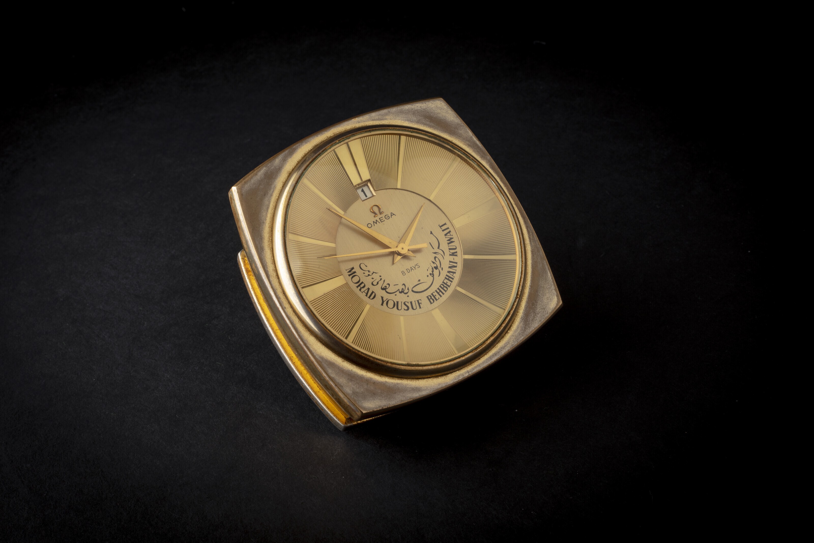 OMEGA, 8-DAYS CLOCK, A GILT BRASS MECHANICAL CLOCK MADE FOR KUWAITI ...