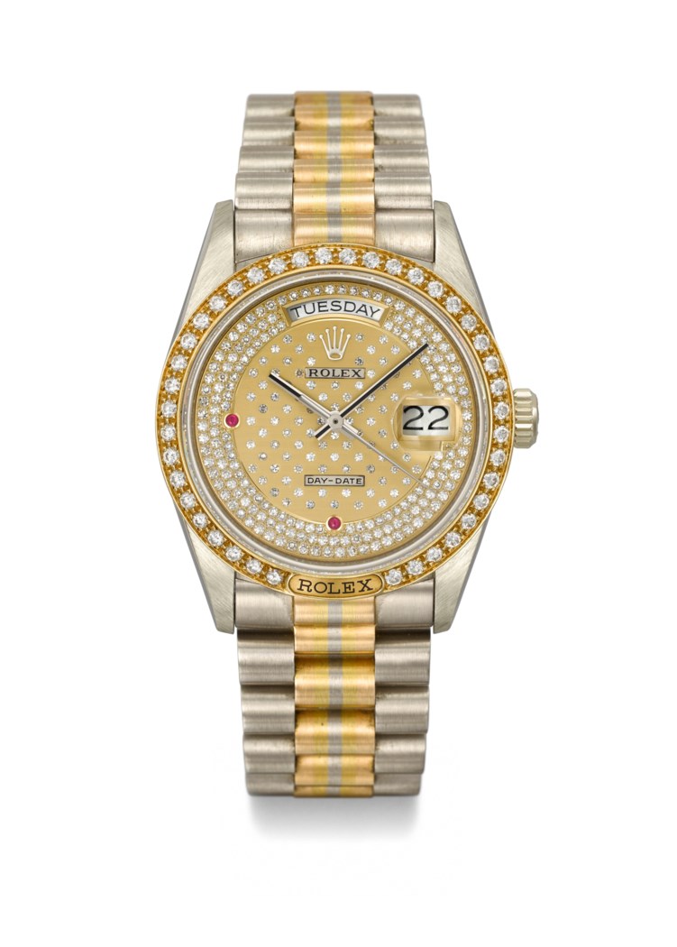 ROLEX. A VERY RARE AND ATTRACTIVE THREE COLOUR GOLD, DIAMOND AND RUBY ...