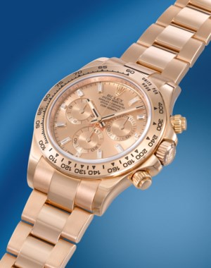 ROLEX. A RARE AND ATTRACTIVE 18K PINK GOLD AND DIAMOND-SET AUTOMATIC ...