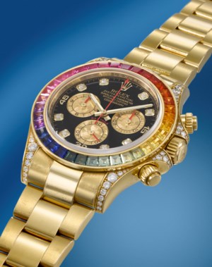 ROLEX. A RARE AND IMPRESSIVE 18K GOLD, DIAMOND AND MULTI-COLOURED ...