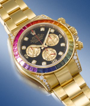 ROLEX. A RARE AND IMPRESSIVE 18K GOLD, DIAMOND AND MULTI-COLOURED ...