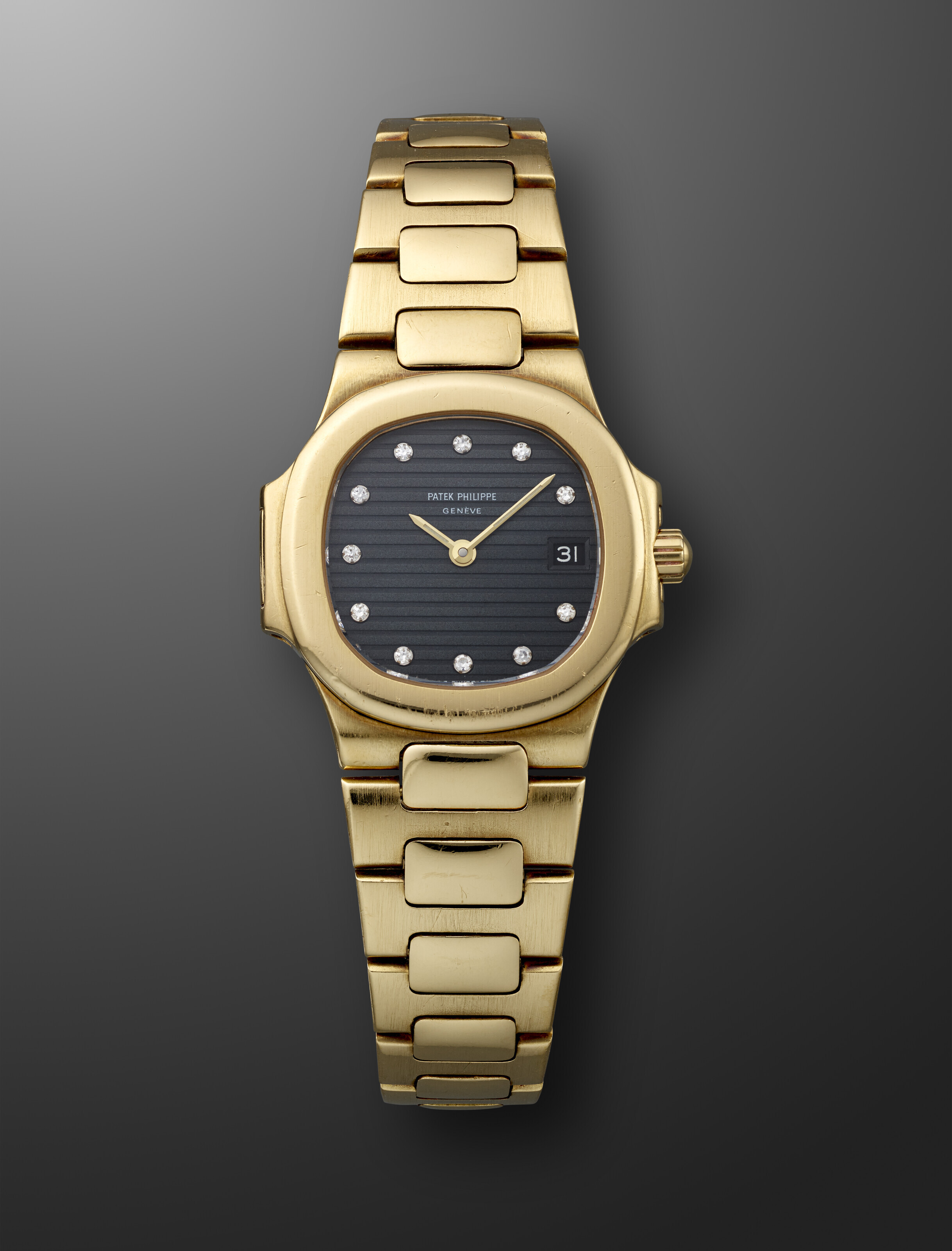 PATEK PHILIPPE, YELLOW GOLD AND DIAMOND-SET 'LADY NAUTILUS', REF. 4700 ...