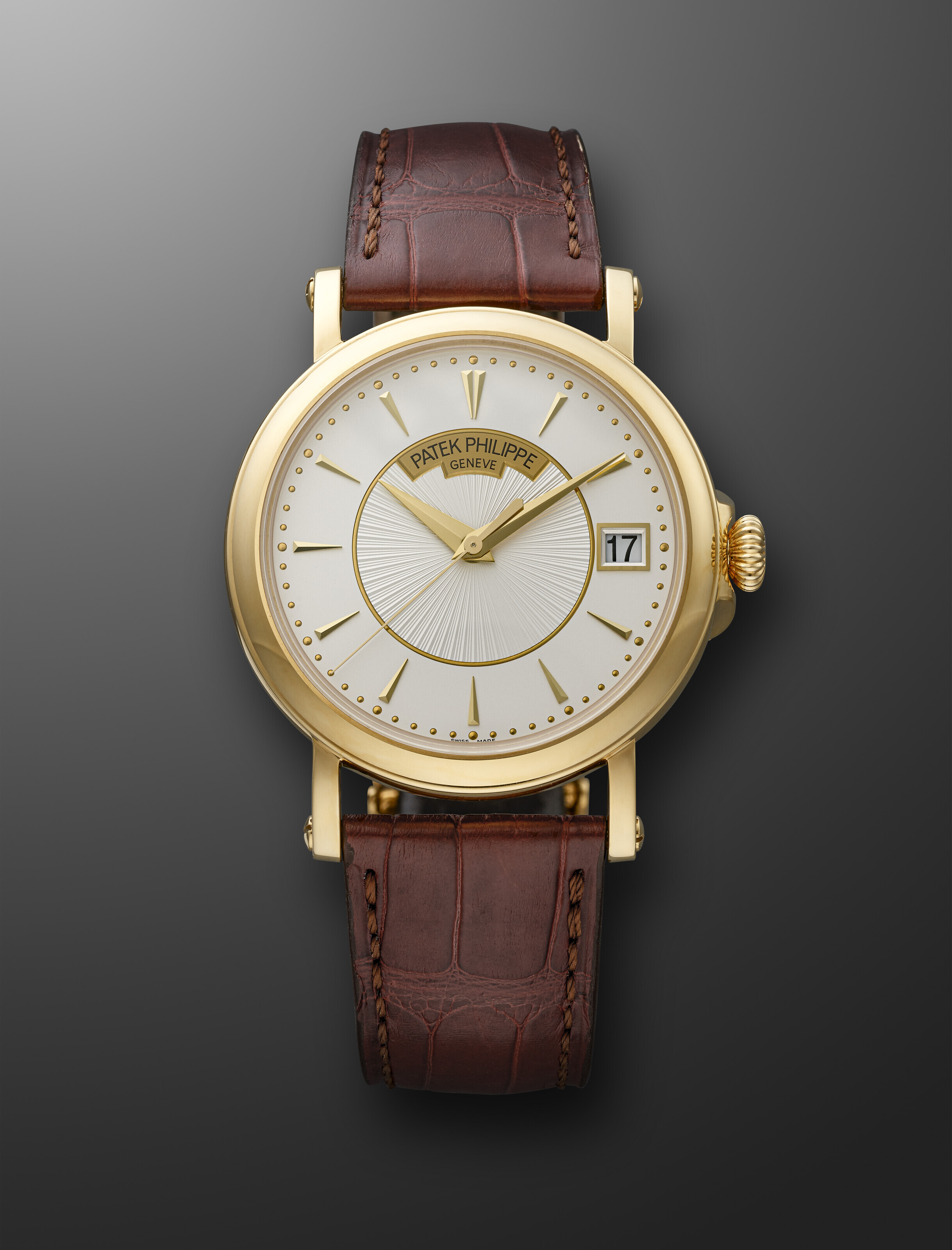 PATEK PHILIPPE, YELLOW GOLD 'CALATRAVA', REF. 5153J-001, | Christie’s