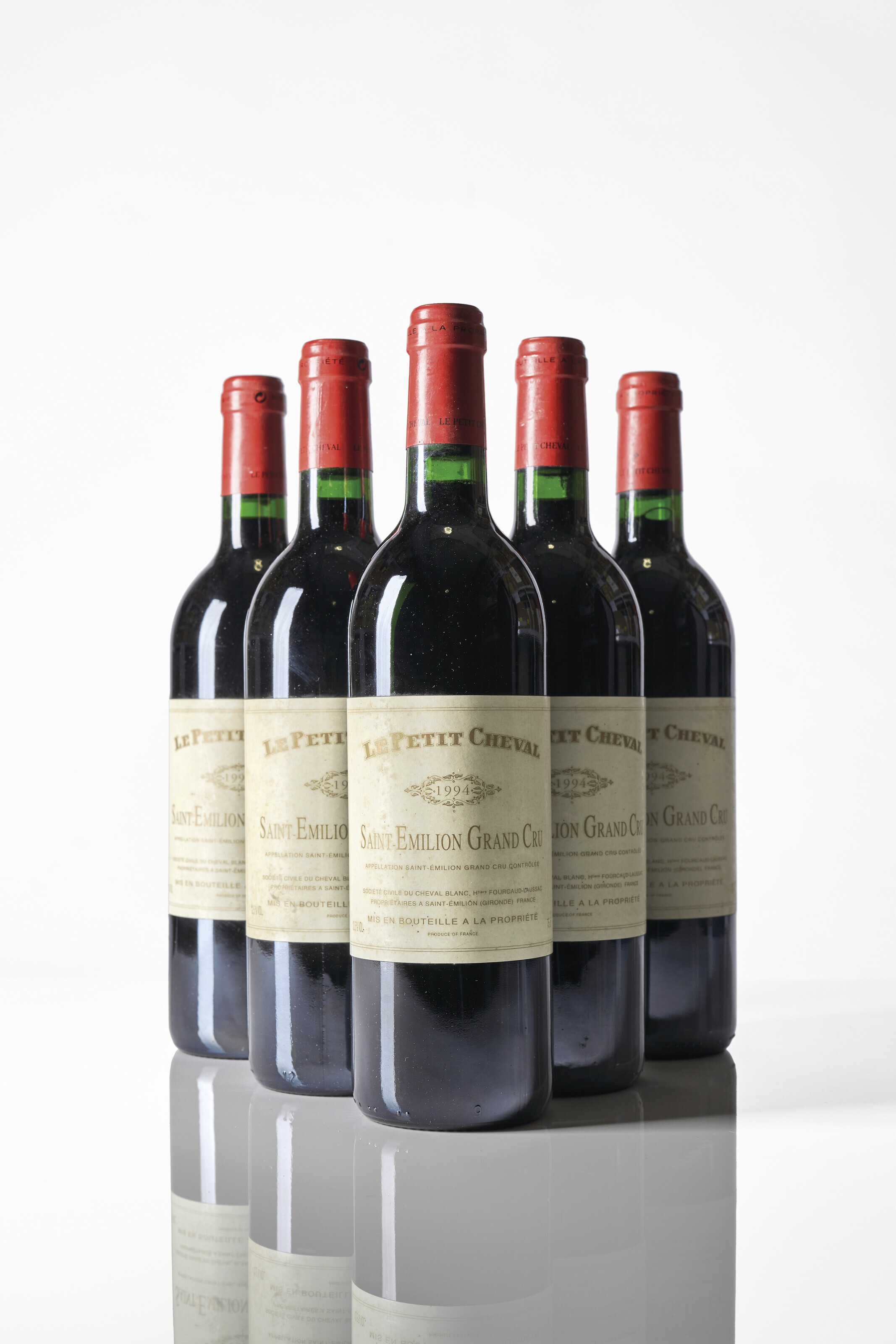 Le Petit Cheval 1994, Saint-ÉmilionBin-soiled and faded labels. Levels ...