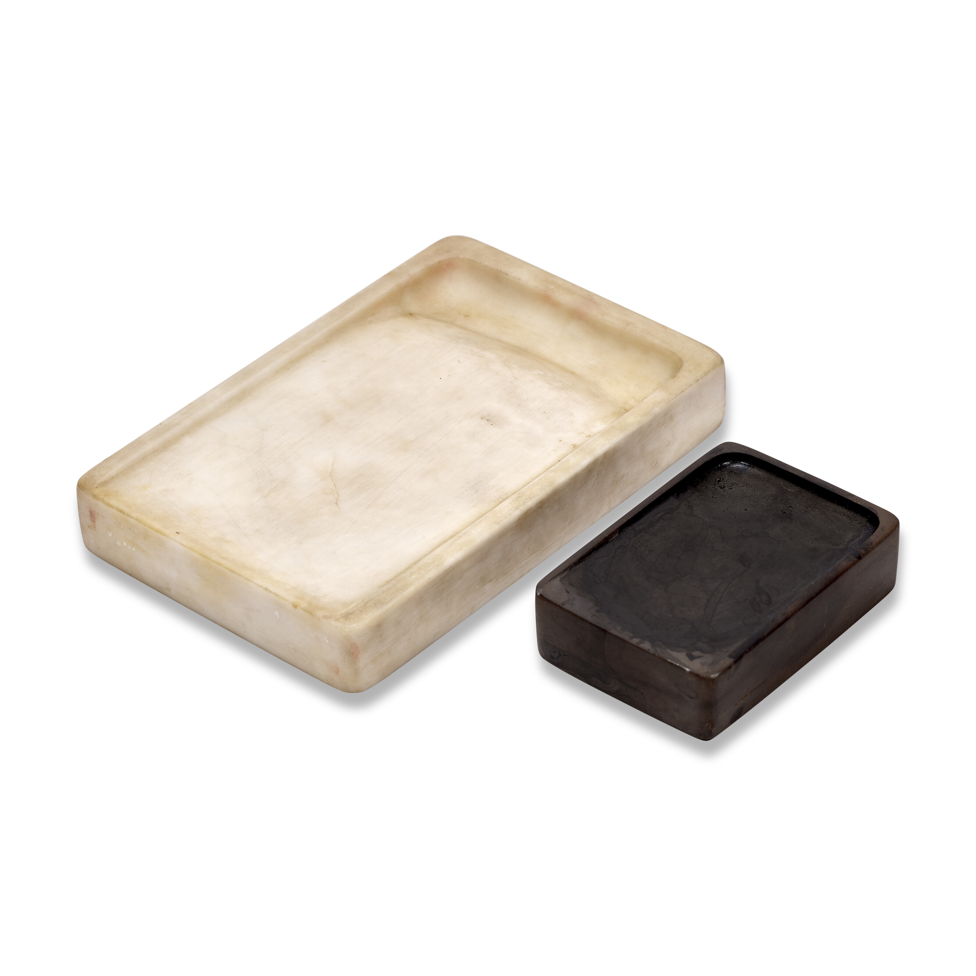 A RECTANGULAR MARBLE INKSTONE AND A SMALL INSCRIBED INKSTONE, | Christie’s