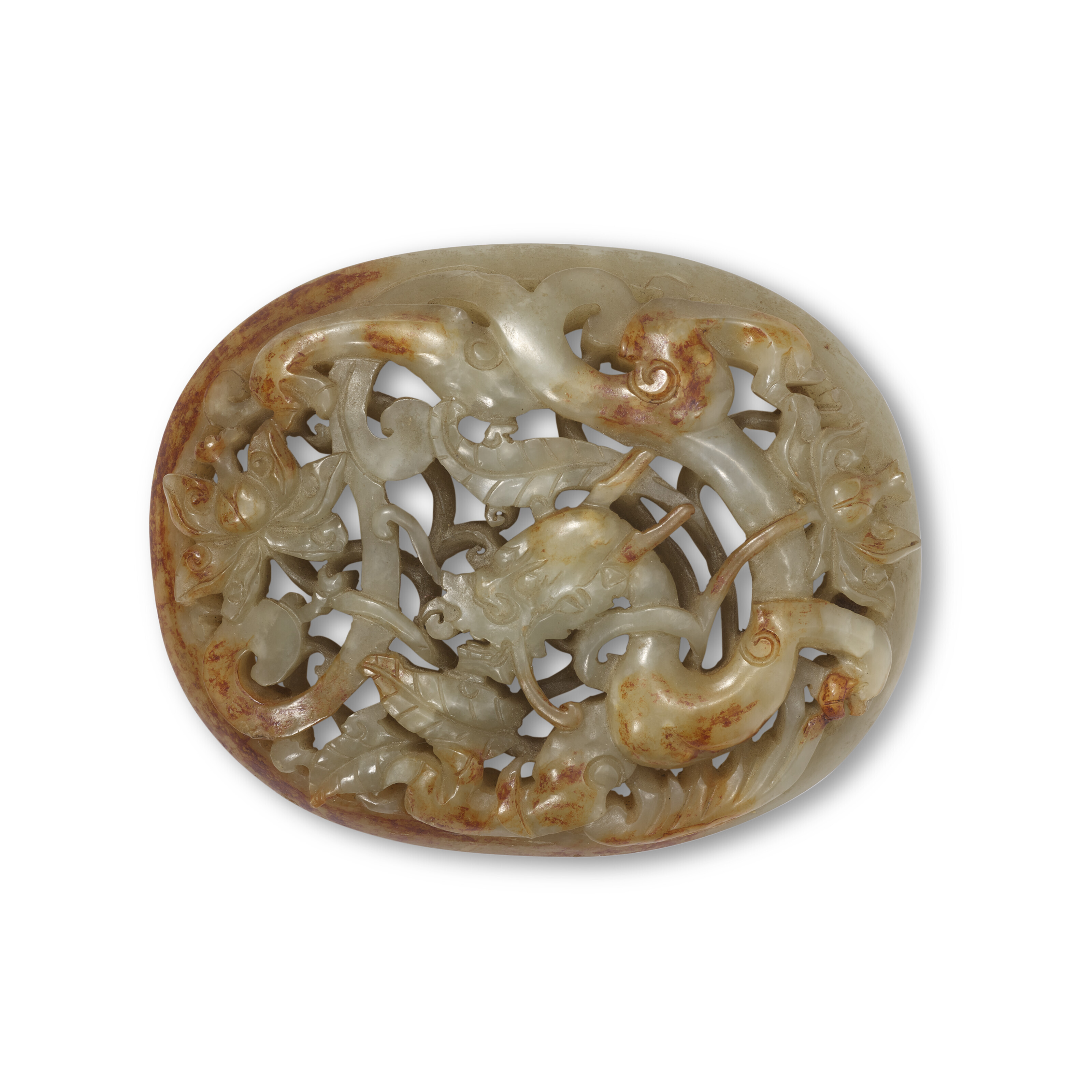 A RETICULATED CELADON AND RUSSET JADE 'DRAGON' PLAQUE, MING DYNASTY ...