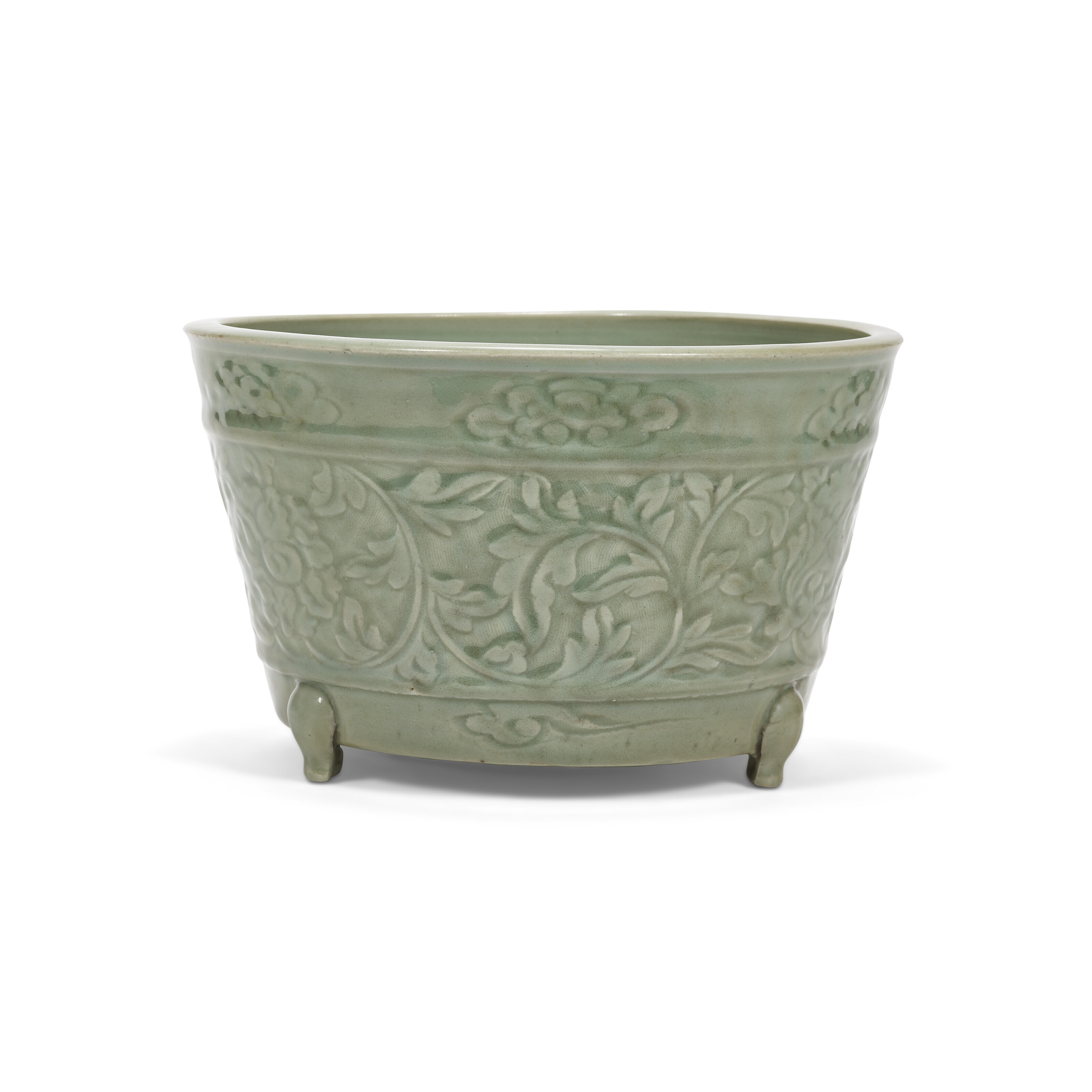 A LONGQUAN CELADON CARVED 'PEONY SCROLL' TRIPOD CENSER, MING DYNASTY ...
