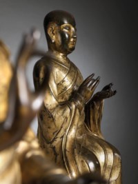 AN EXCEEDINGLY RARE PAIR OF GILT-BRONZE SEATED LUOHAN FIGURES, YUAN ...
