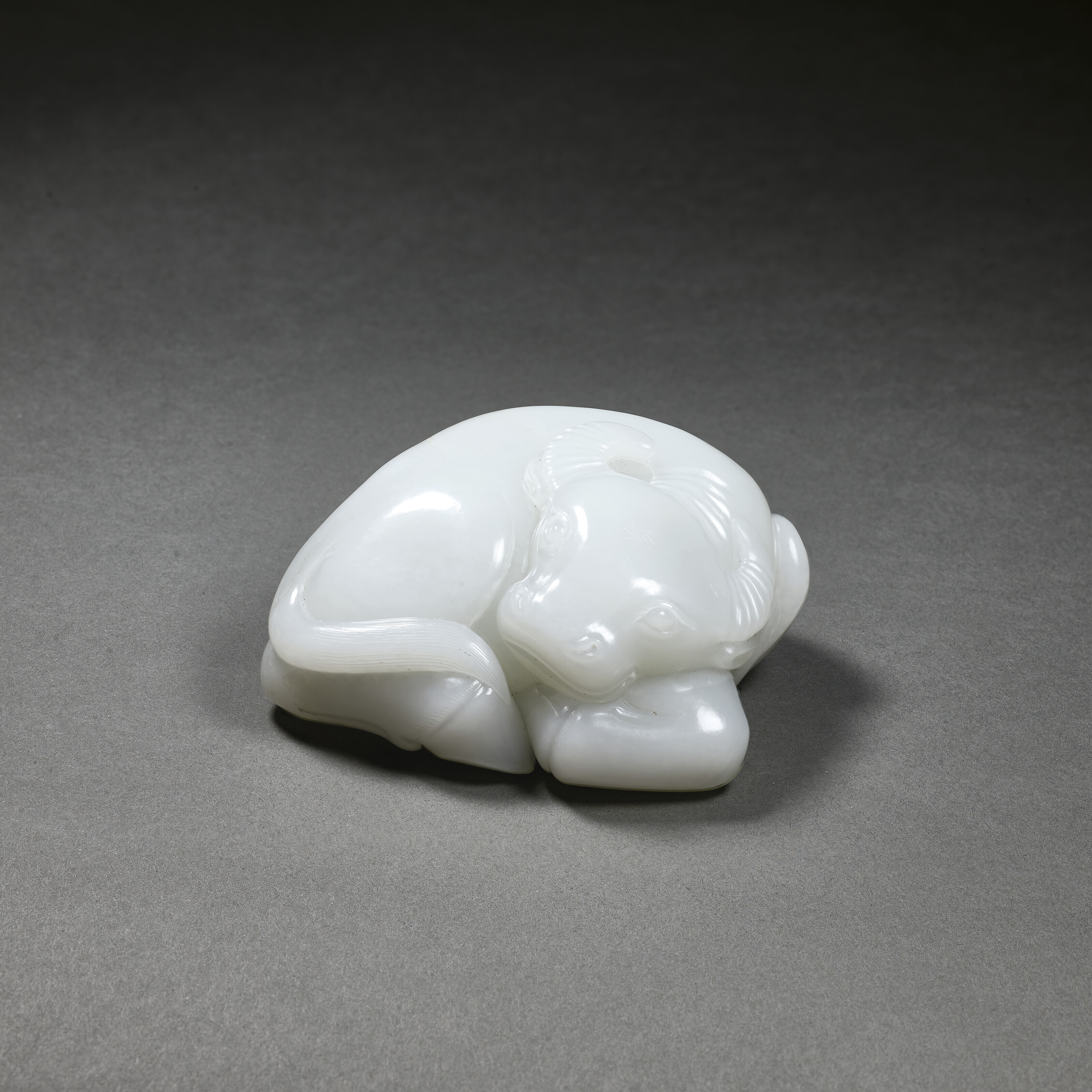 A JADE AND HARDSTONE EMBELLISHED REPOUSSE GILT-METAL MIRROR, SQUARE ...