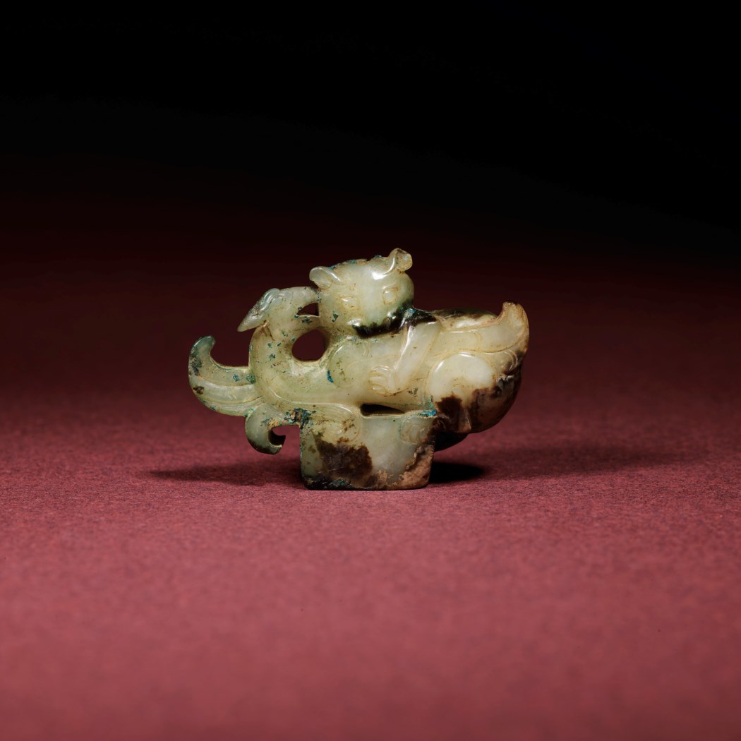 A VERY RARE JADE CARVING OF AN 'EAGLE AND BEAR' GROUP, WESTERN HAN ...