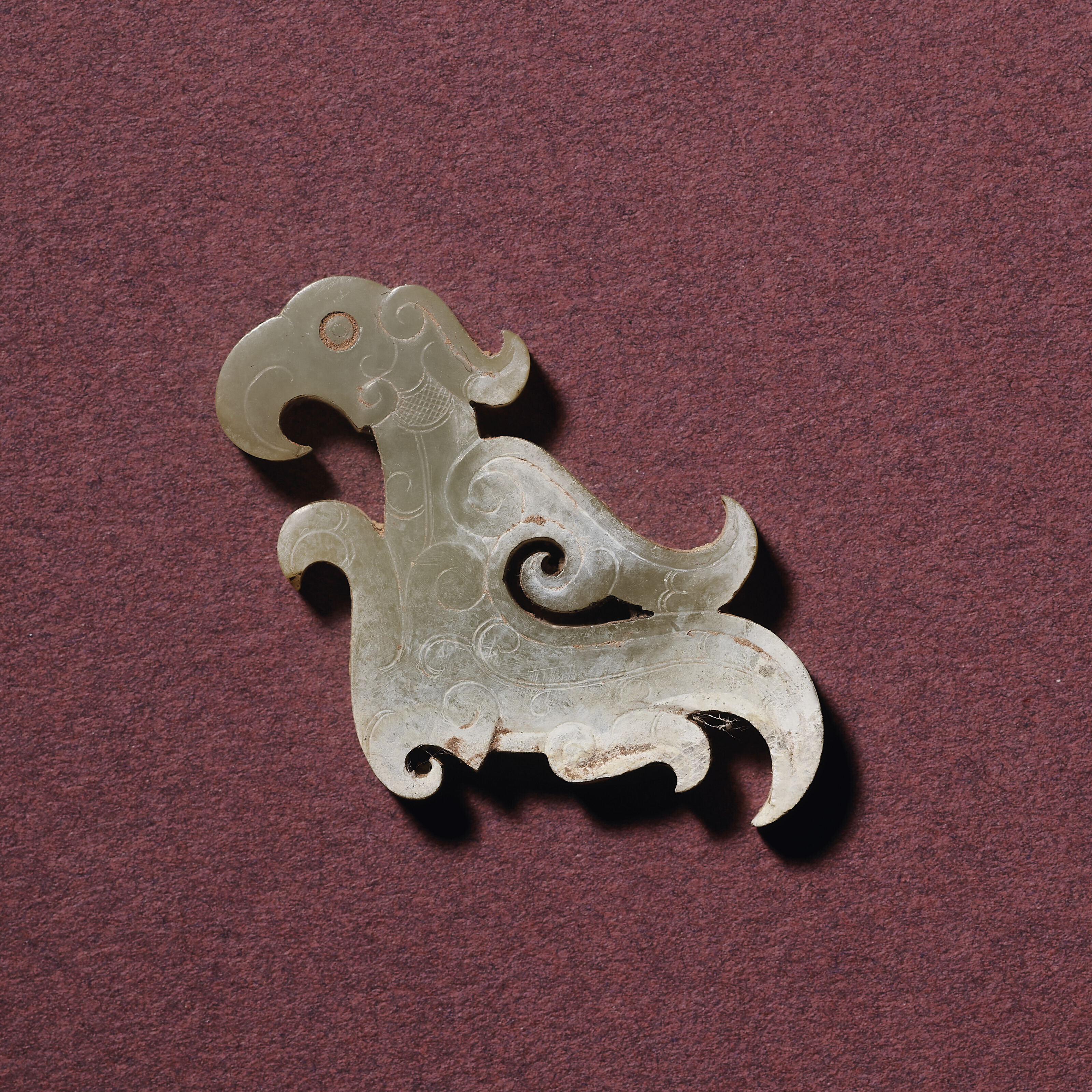 A JADE DRAGON-FORM PENDANT, WESTERN HAN DYNASTY (206 BC-AD 8) | Christie's