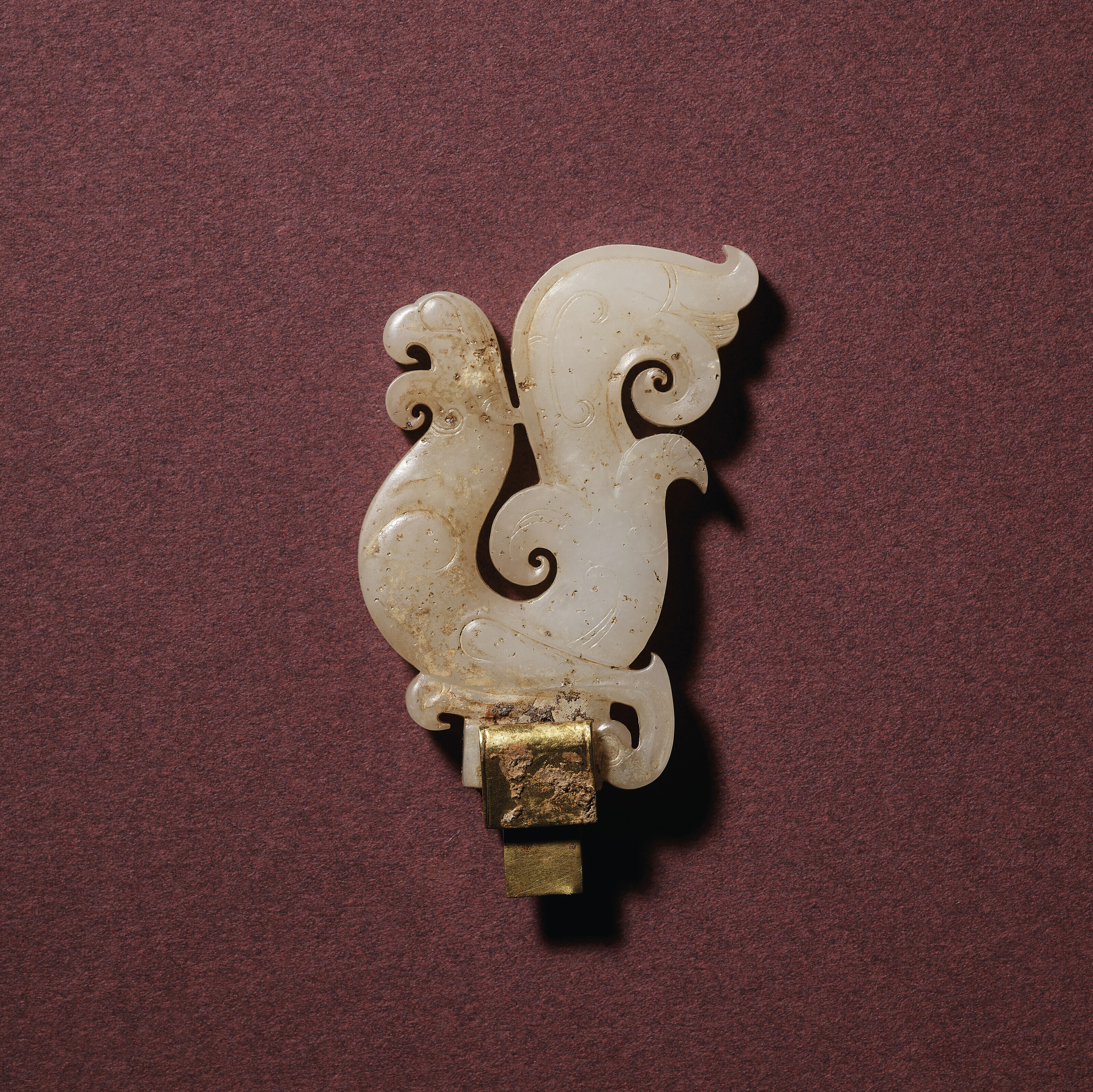 A JADE DRAGON-FORM PENDANT, WESTERN HAN DYNASTY (206 BC-AD 8) | Christie's