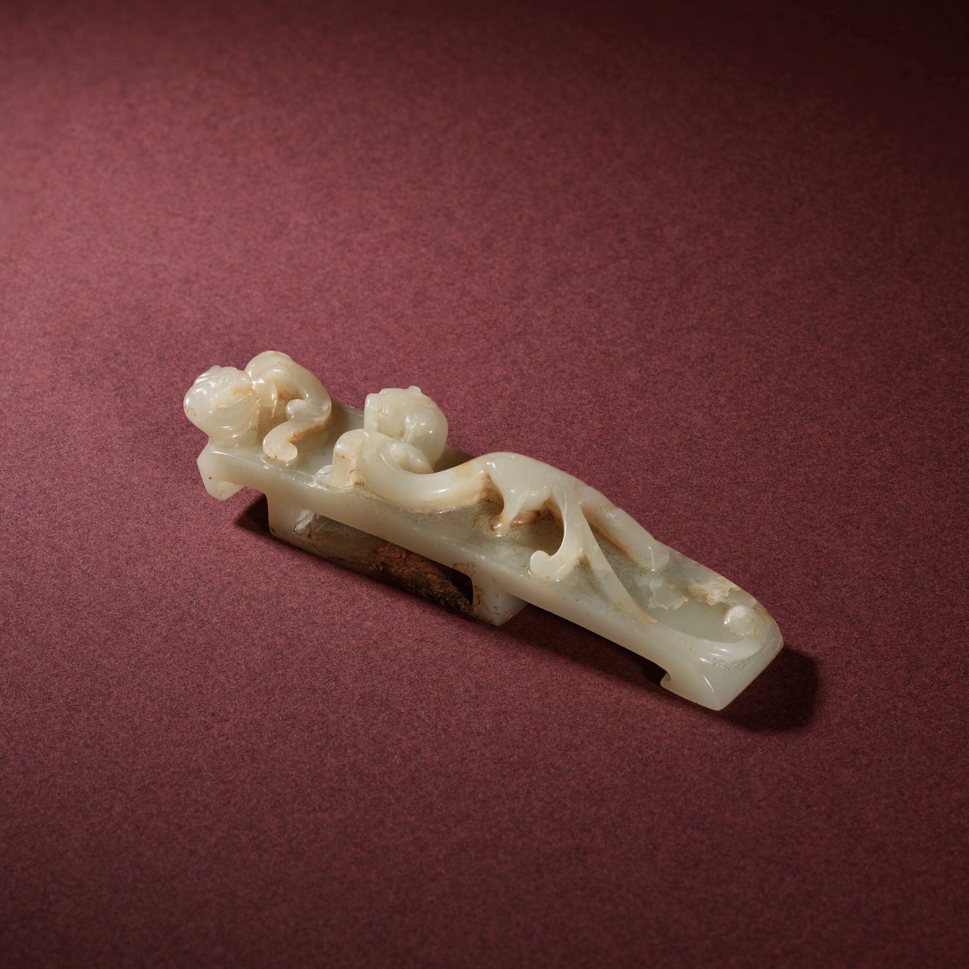 A SUPERB WHITE JADE ‘CHILONG’ SWORD SLIDE, WESTERN HAN DYNASTY (206 BC ...