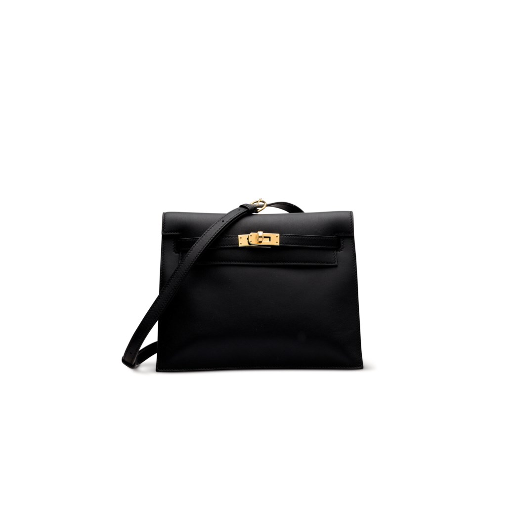 A BLACK SWIFT LEATHER KELLY DANSE WITH GOLD HARDWARE, HERMÈS, 2021 ...