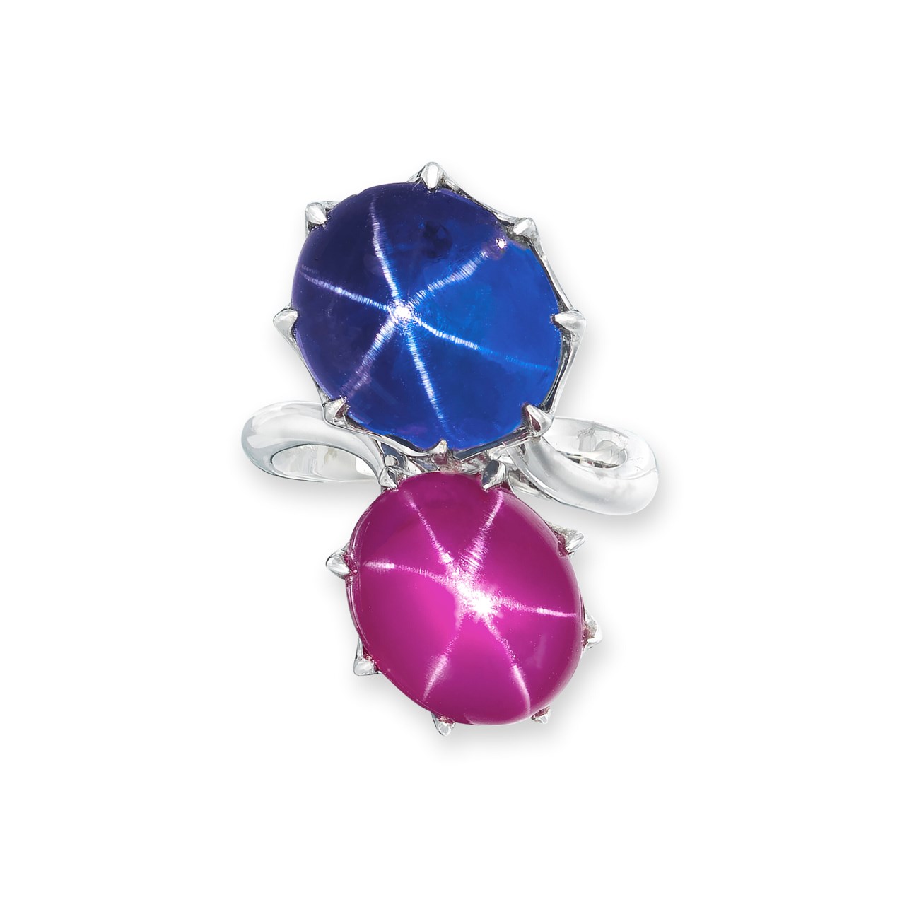 STAR SAPPHIRE AND STAR RUBY RING | Christie's
