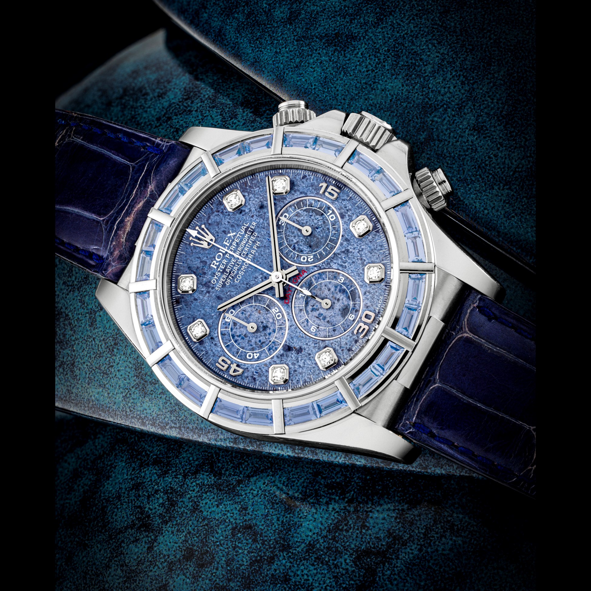 ROLEX. A VERY RARE 18K WHITE GOLD AND SAPPHIRE-SET AUTOMATIC ...