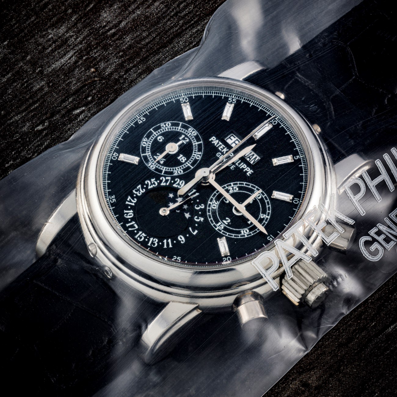 PATEK PHILIPPE. AN EXTREMELY RARE PLATINUM SPLIT SECONDS CHRONOGRAPH ...