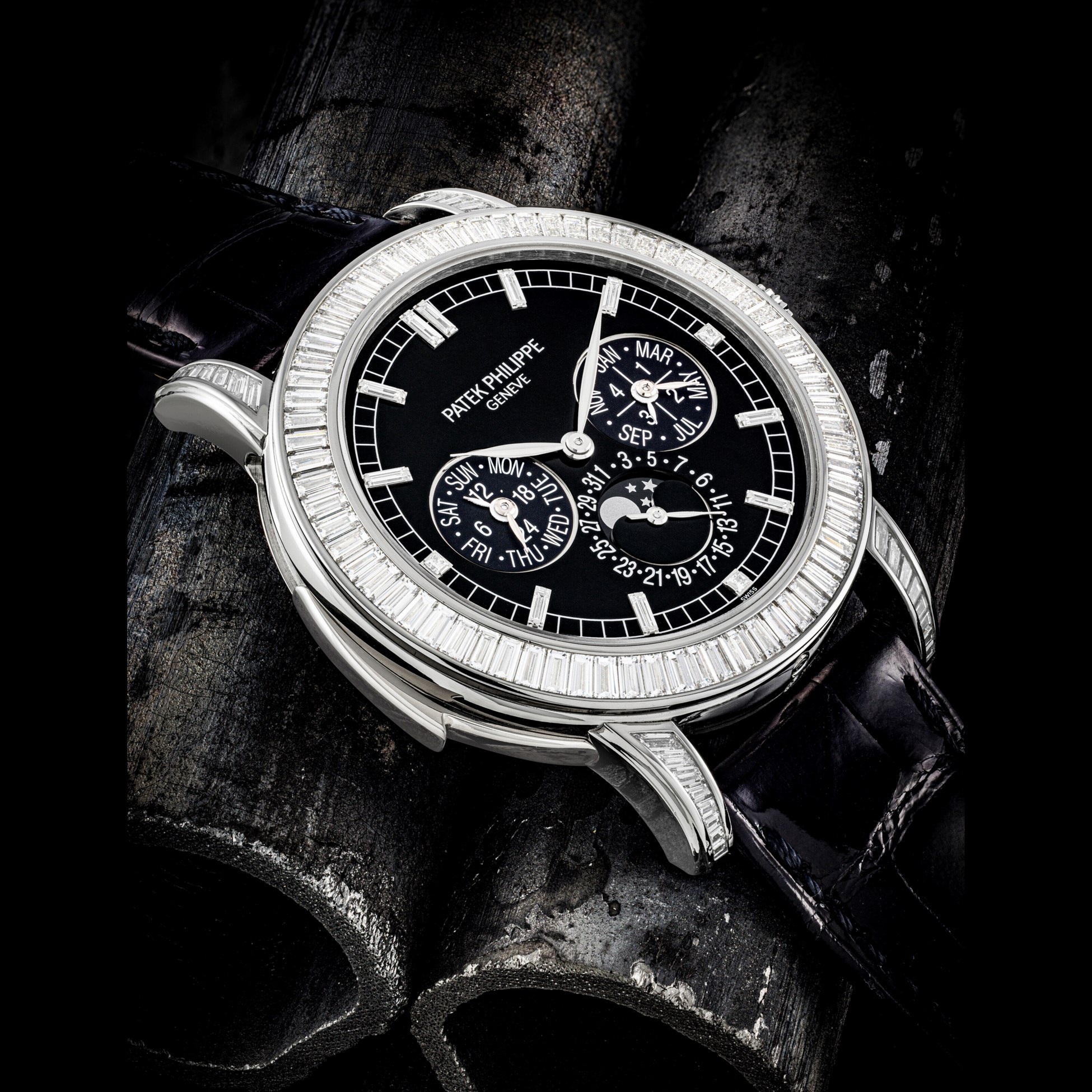 PATEK PHILIPPE. AN EXTREMELY RARE AND MAGNIFICENT PLATINUM AND BAGUETTE ...