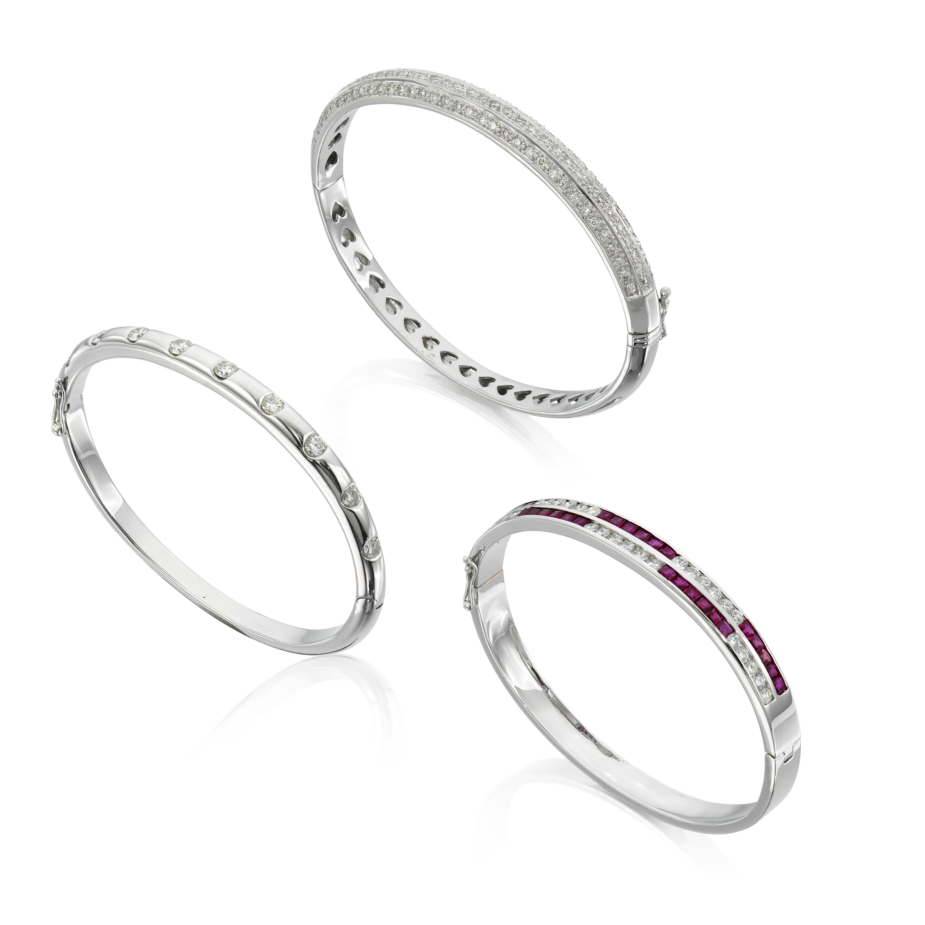 RUBY AND DIAMOND BANGLE; TOGETHER WITH TWO DIAMOND BANGLES, | Christie’s