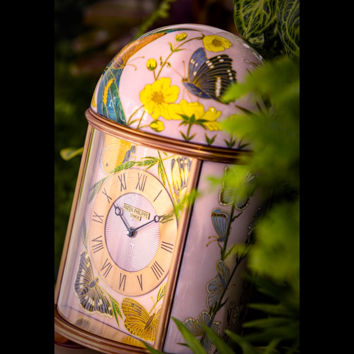 PATEK PHILIPPE. A UNIQUE GILT BRASS DOME TABLE CLOCK WITH CLOISONNÉ ...