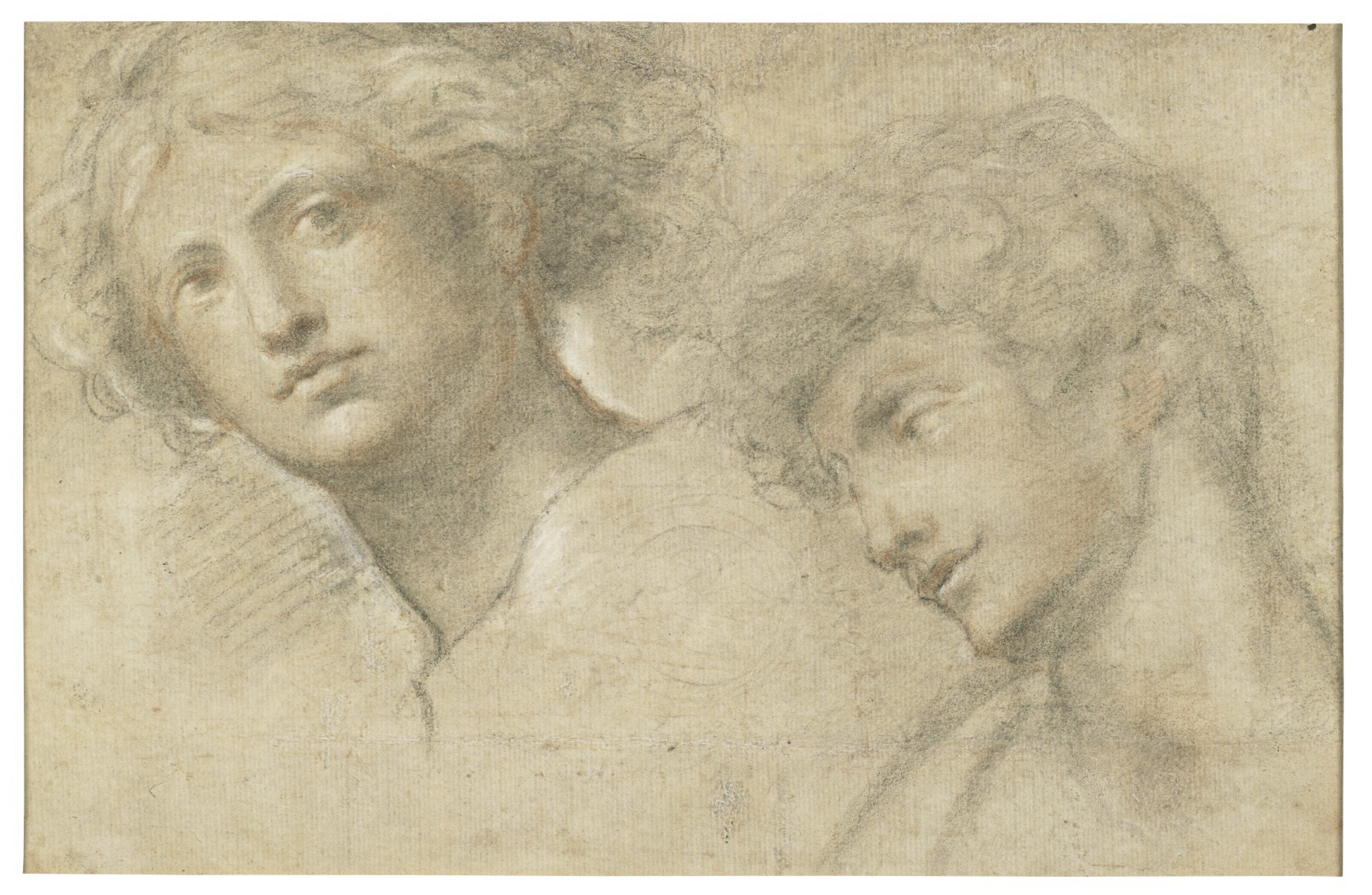 ITALIAN SCHOOL, CIRCA 1600, Studies of heads (recto); Two seated angels ...