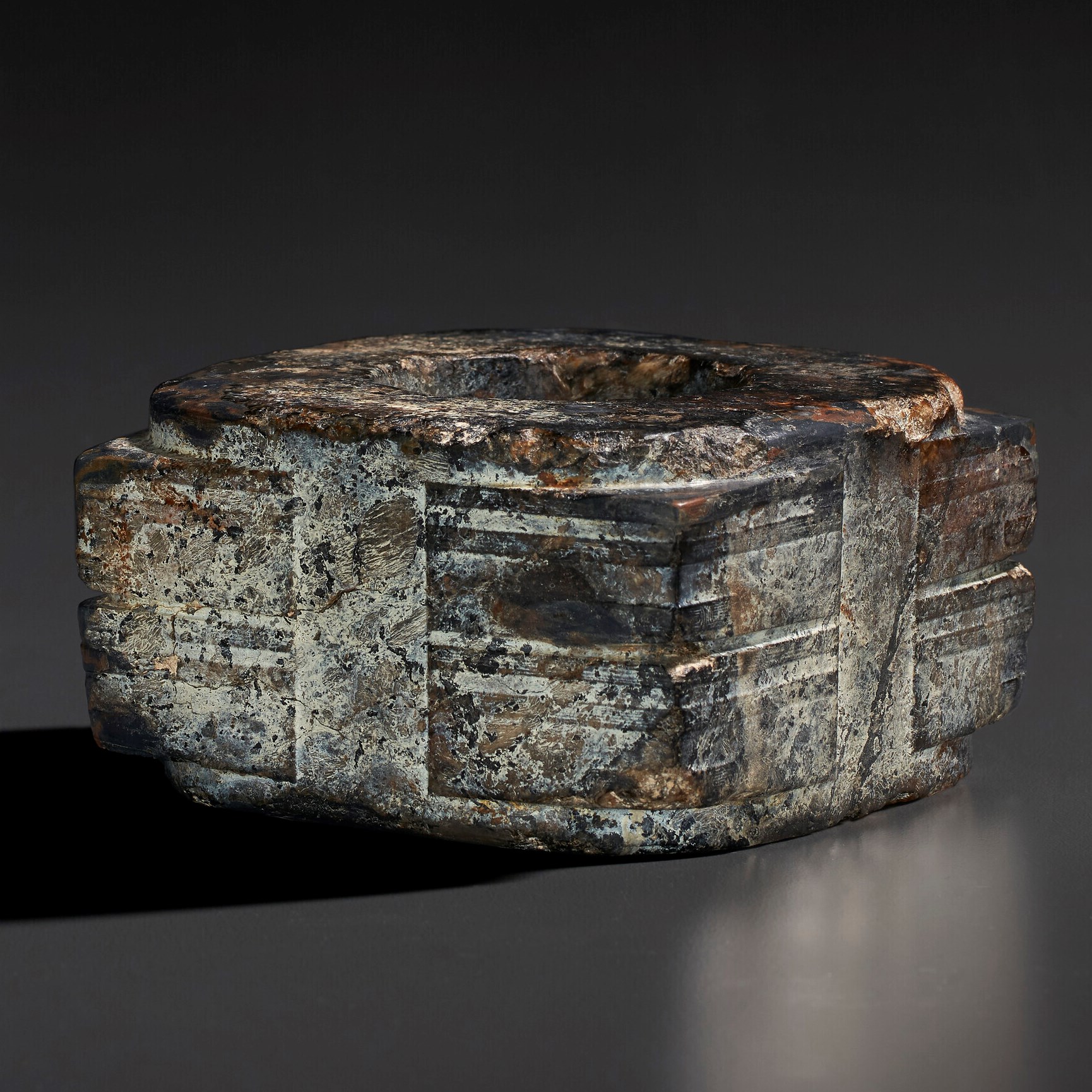 A LARGE MOTTLED BLACK AND BROWN JADE CONG, NEOLITHIC PERIOD, 3RD ...