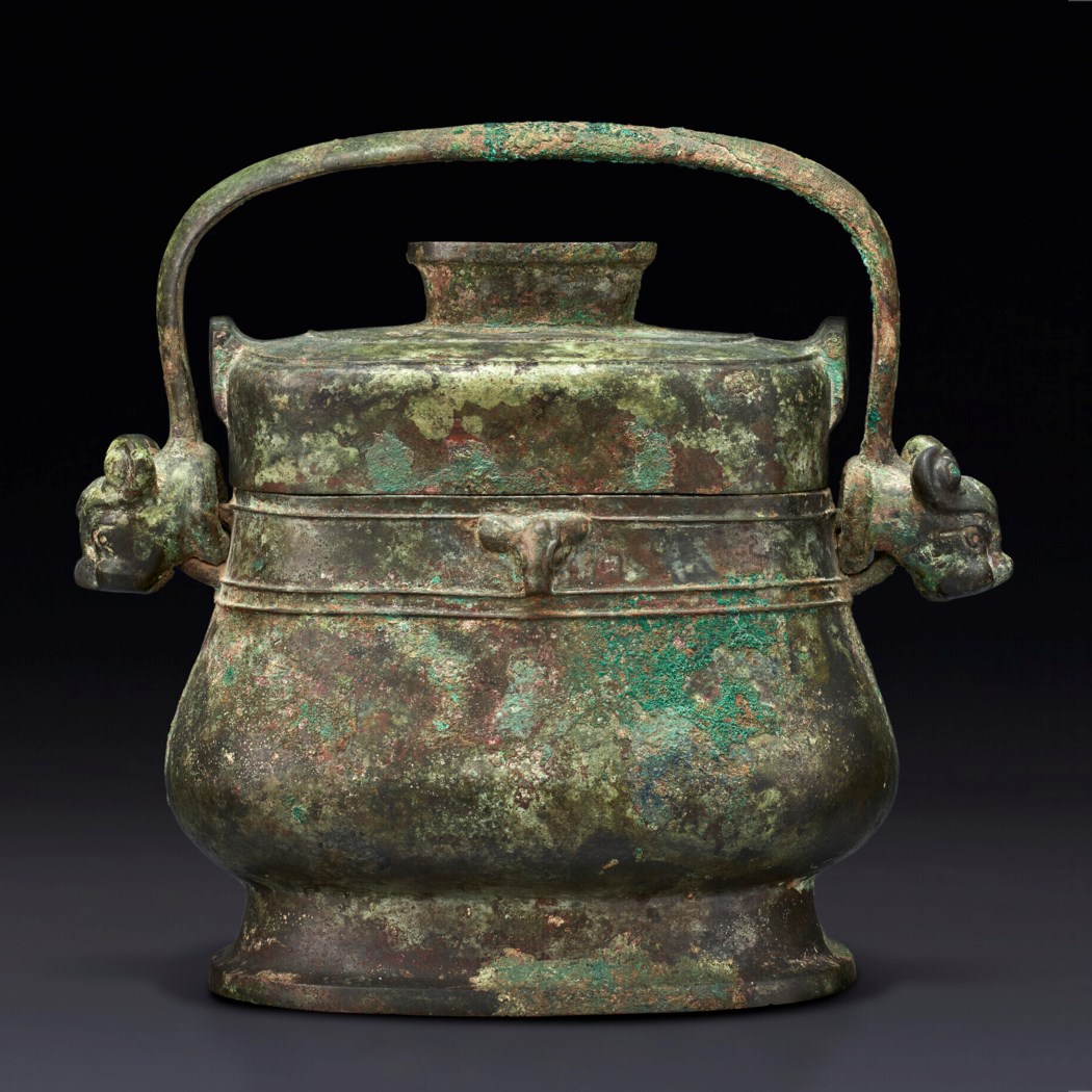 A BRONZE RITUAL WINE VESSEL AND COVER, YOU, EARLY WESTERN ZHOU DYNASTY ...