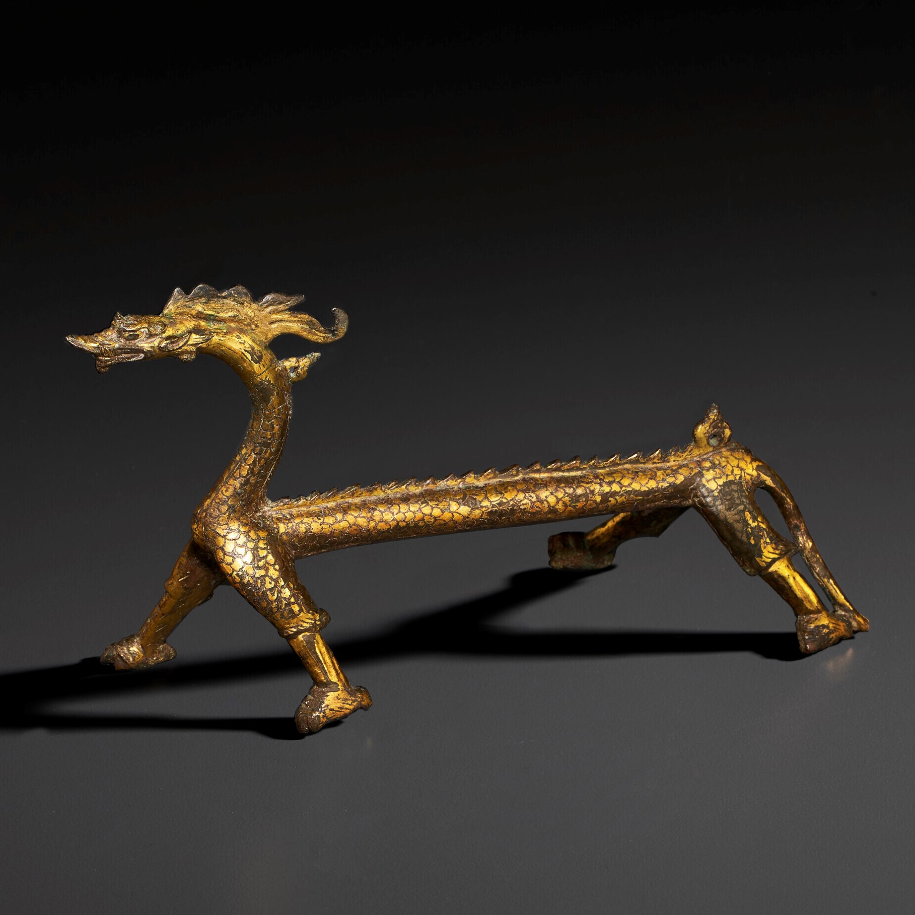 A RARE GILT-BRONZE FIGURE OF A DRAGON, TANG DYNASTY (AD 618-907 ...
