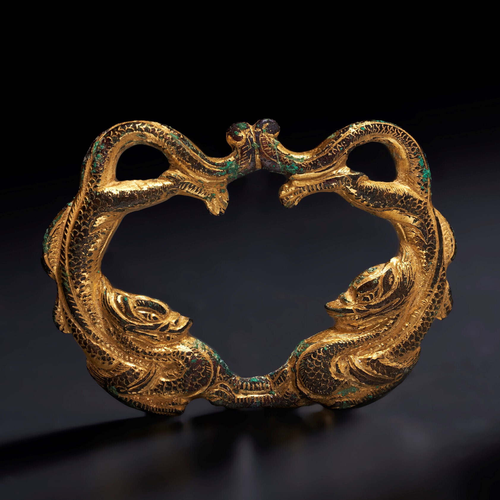 A SMALL GILT-BRONZE DOUBLE DRAGON FITTING, TANG DYNASTY (AD 618-907 ...
