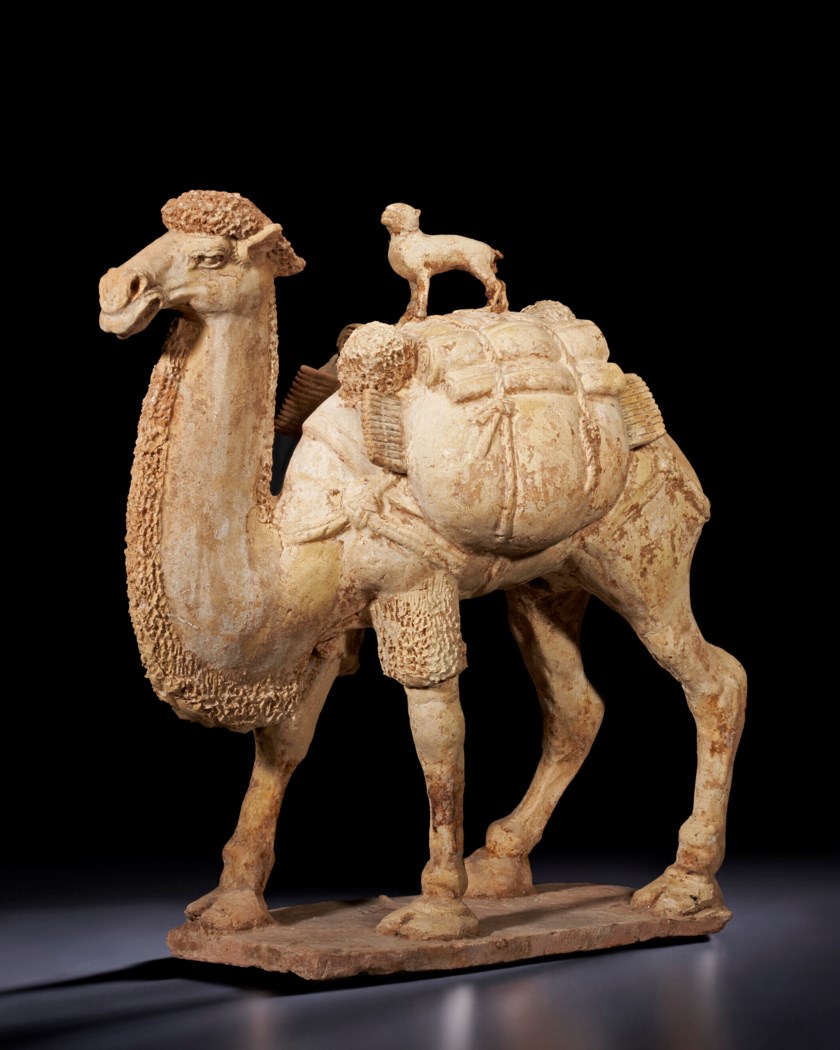 A LARGE WELL-MODELED STRAW-GLAZED BACTRIAN CAMEL, TANG DYNASTY (AD 618 ...