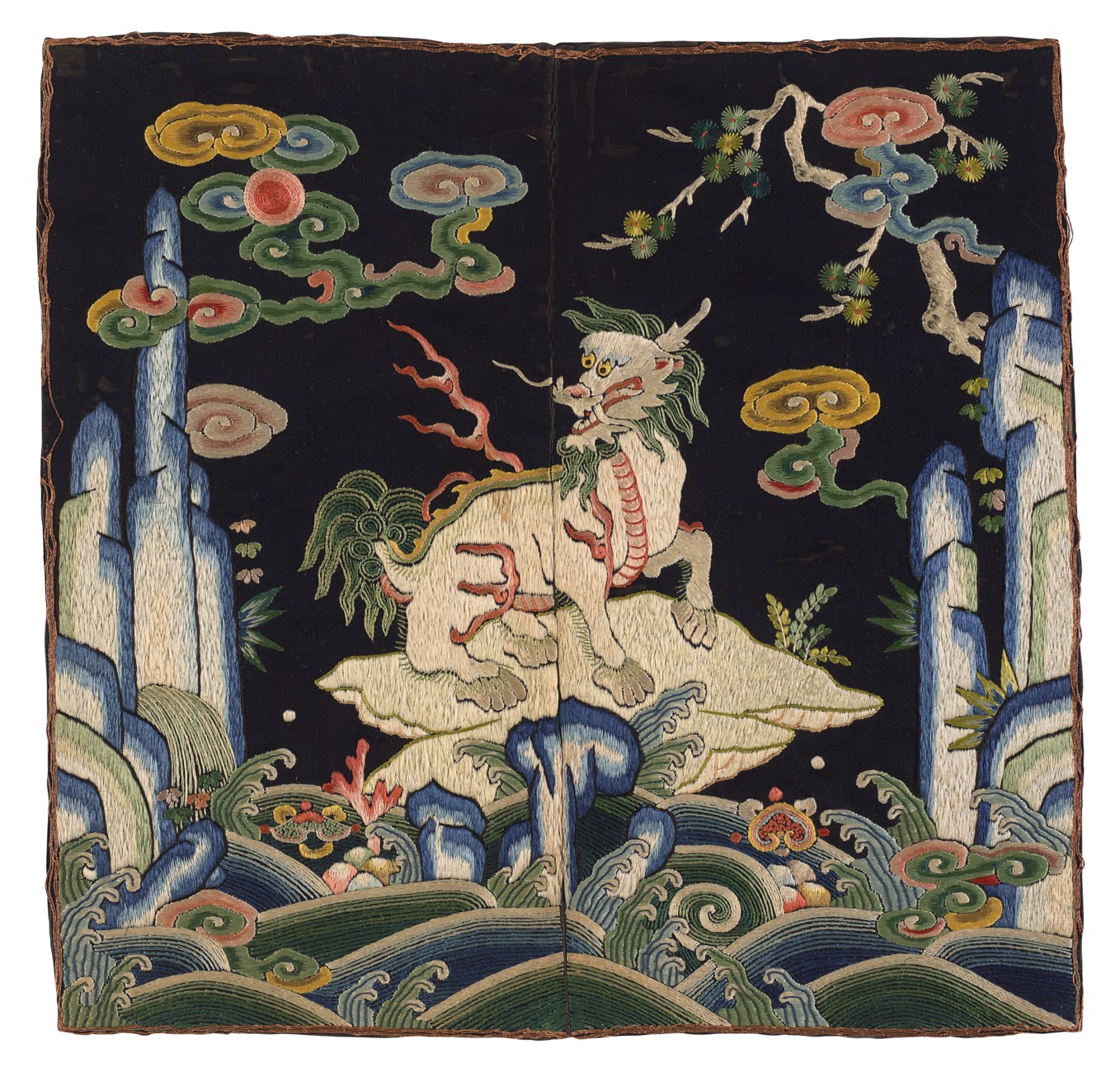 AN EMBROIDERED MIDNIGHT-BLUE SATIN RANK BADGE OF A XIEZHI, BUZI ...