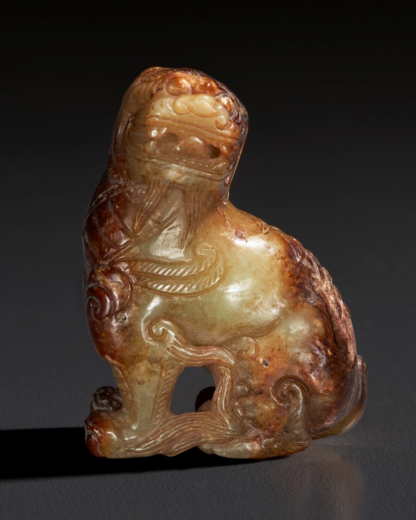 A BEIGE AND BROWN JADE MYTHICAL BEAST, LATE MING-EARLY QING DYNASTY ...