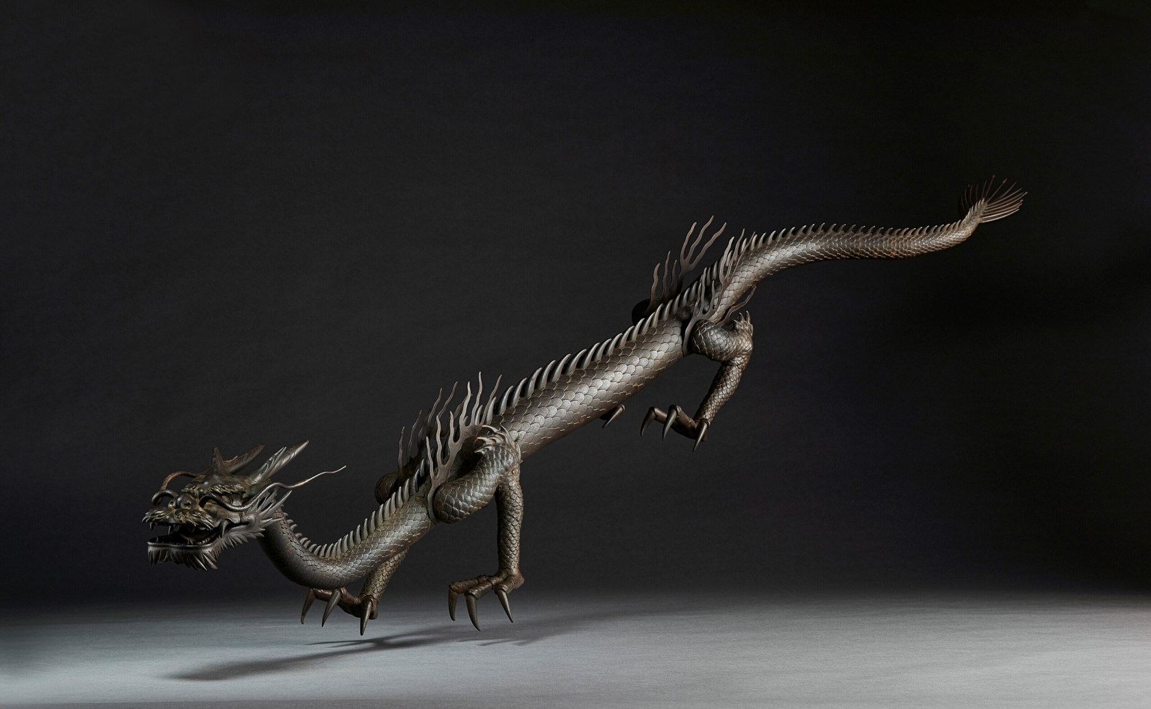 AN IMPRESSIVE IRON ARTICULATED SCULPTURE OF A DRAGON, EDO PERIOD (18TH ...