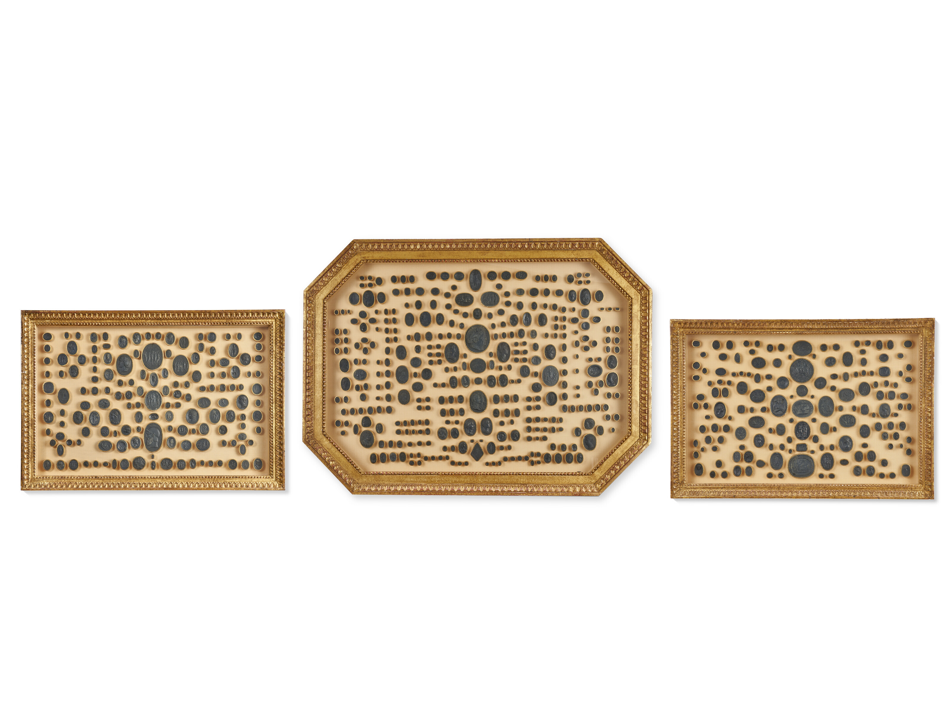 A GROUP OF THREE FRAMED SETS OF INTAGLIO MOLDS, POSSIBLY ITALIAN, LATE ...