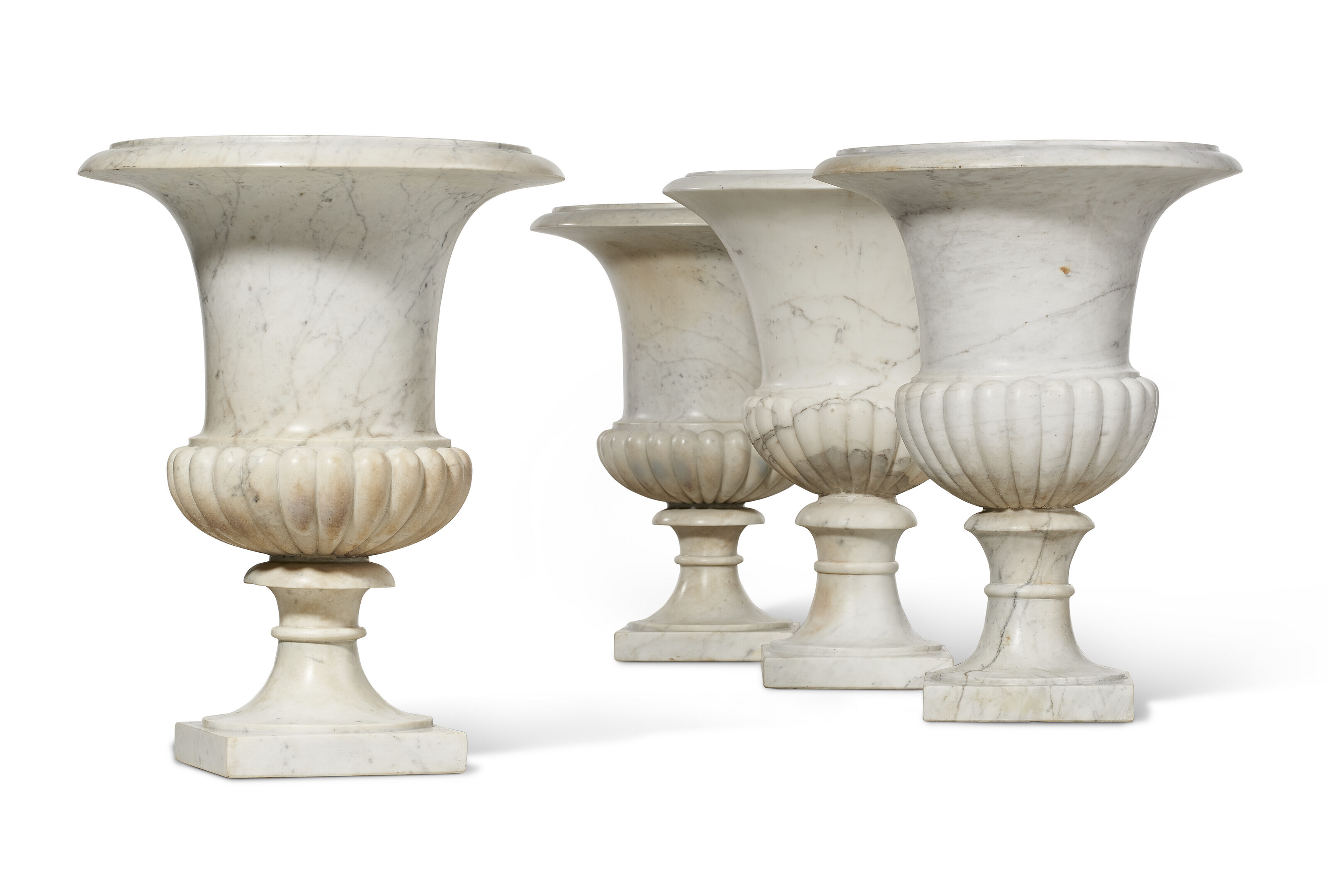 A SET OF FOUR LARGE WHITE MARBLE GARDEN URNS, 20TH CENTURY | Christie’s