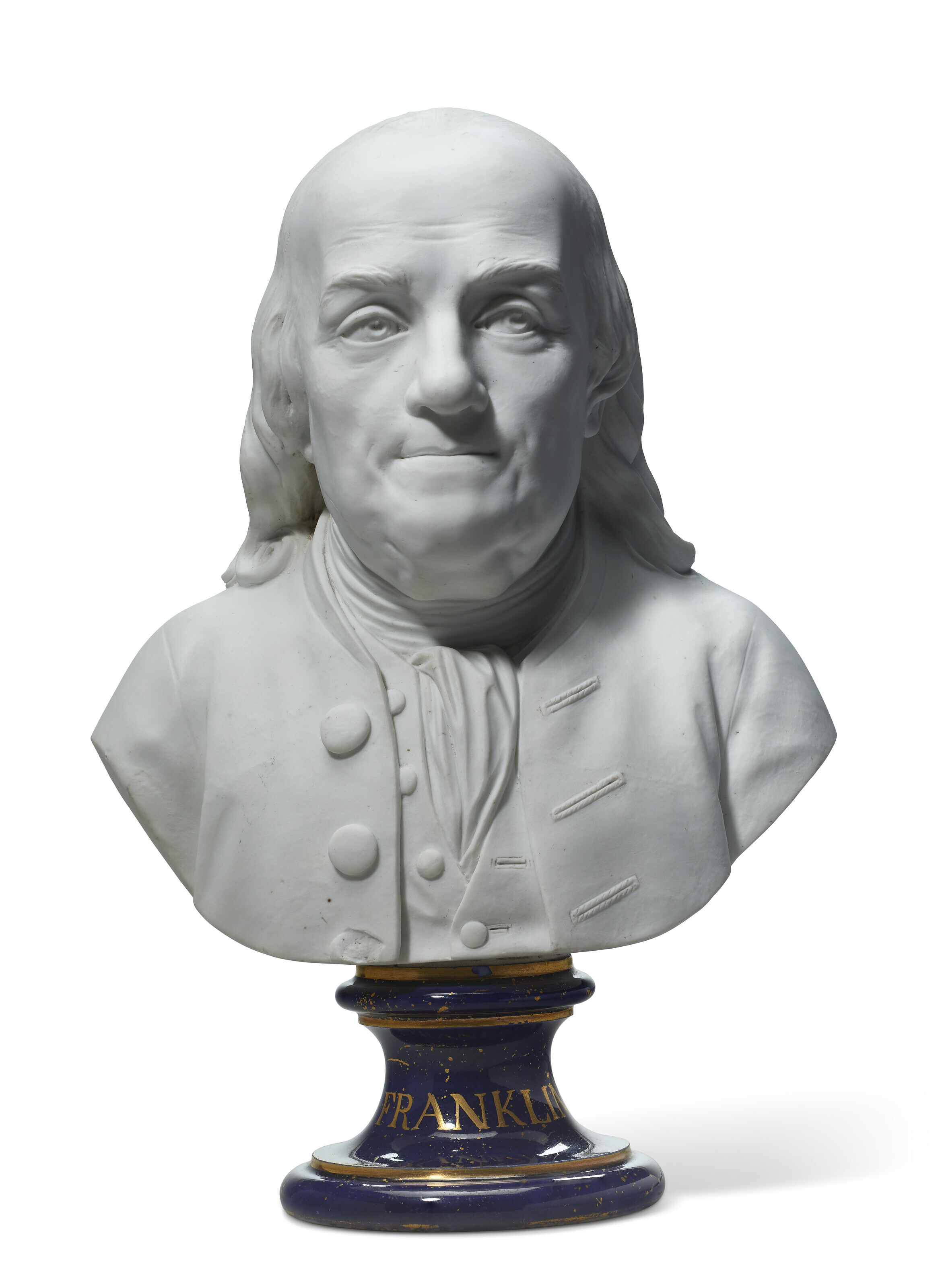 A SEVRES BISCUIT PORCELAIN BUST OF BENJAMIN FRANKLIN ON A FAUX LAPIS ...