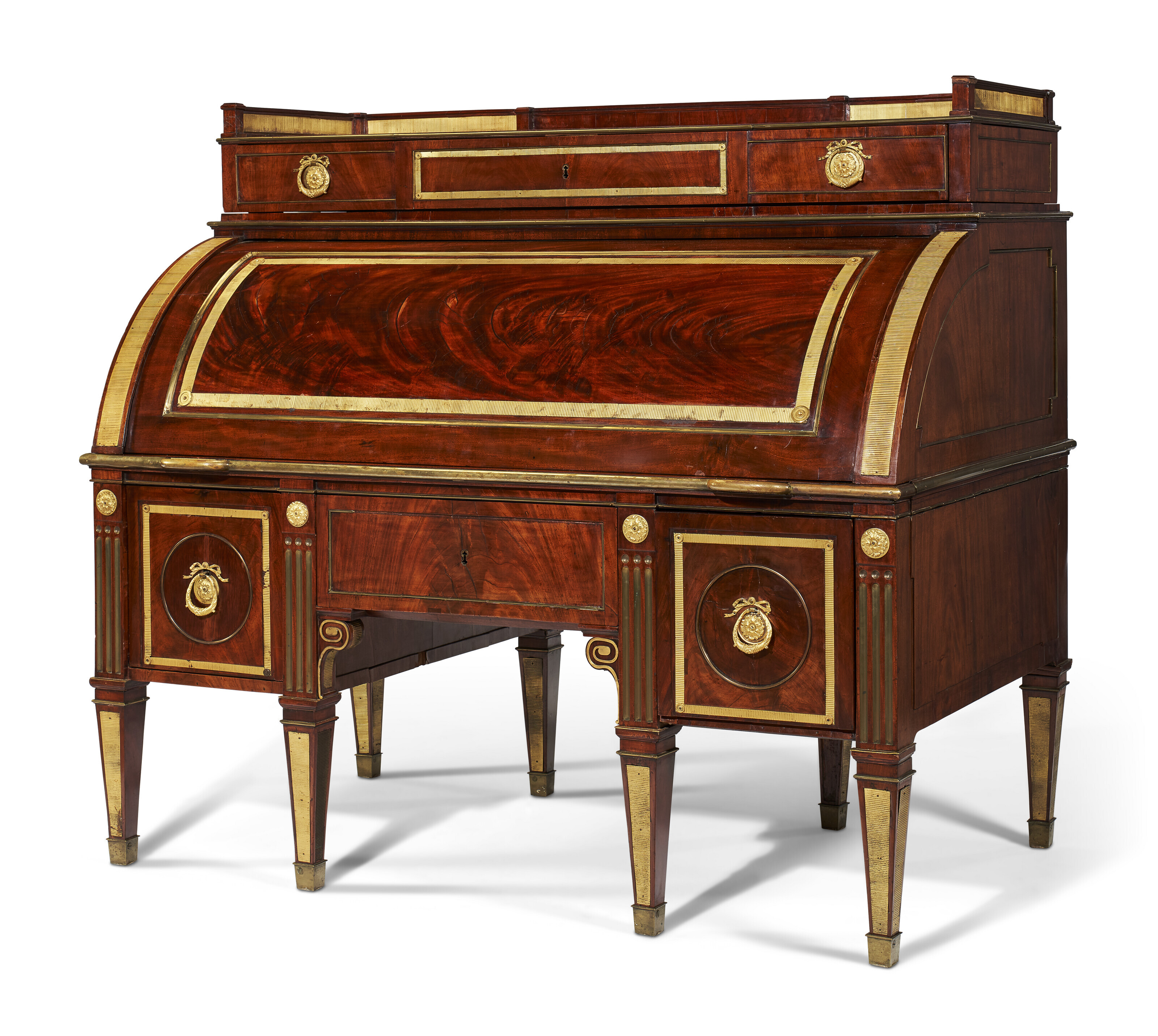 A GERMAN ORMOLU-MOUNTED MAHOGANY CYLINDER BUREAU, BY DAVID ROENTGEN ...